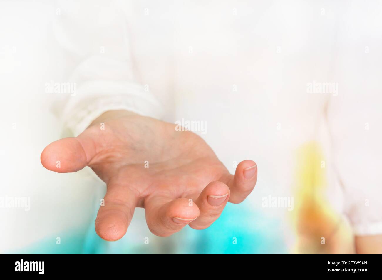 Magic hand with a mystical shine around on white background Stock Photo ...