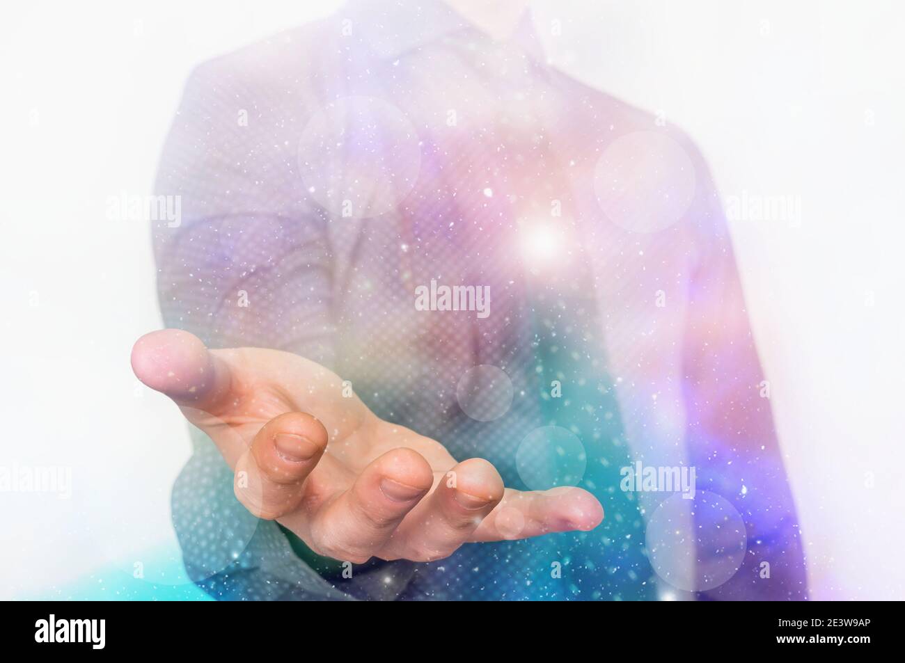 Magic hand with a mystical shine around on white background Stock Photo ...