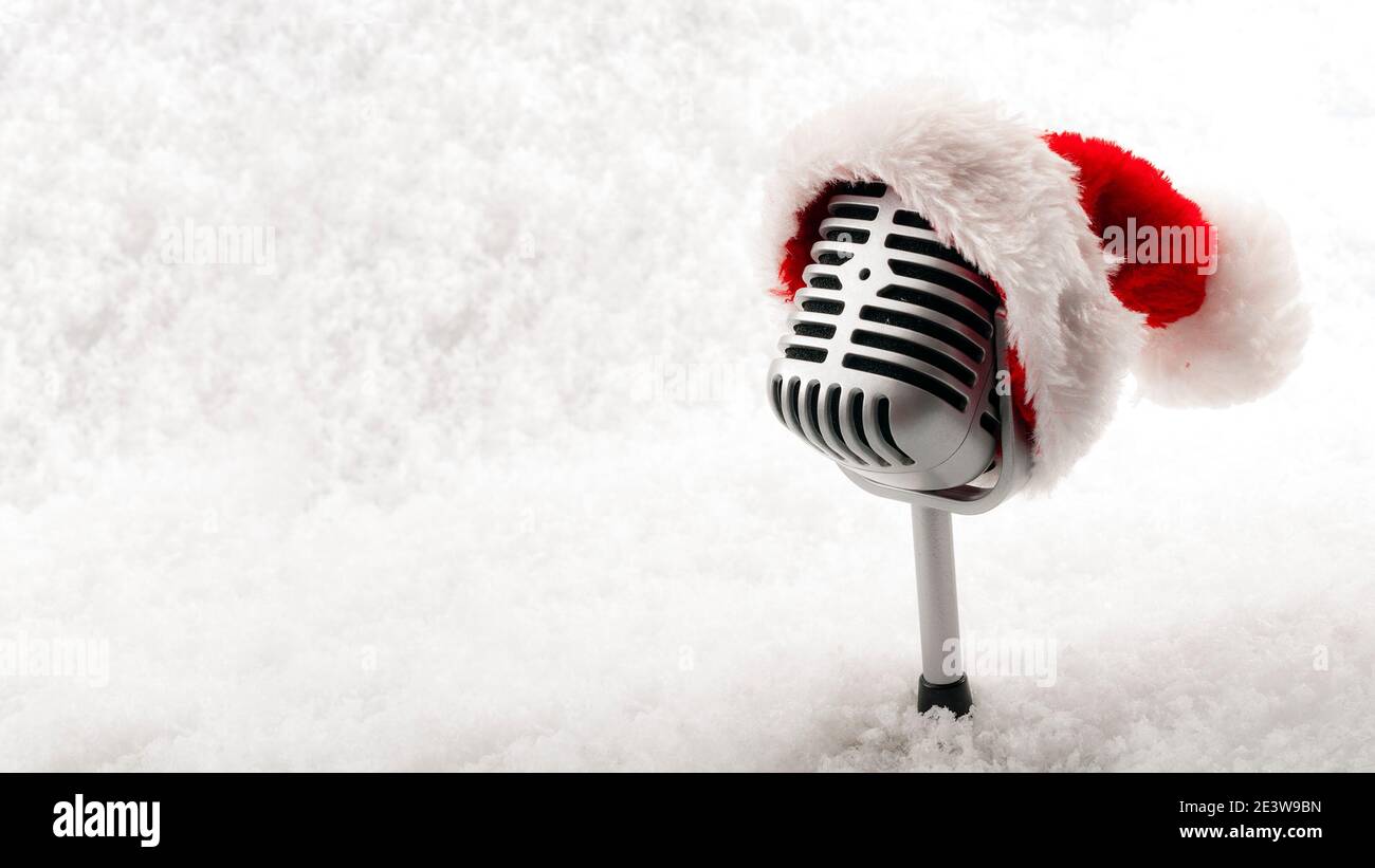 Santa hat over microphone hi-res stock photography and images - Alamy