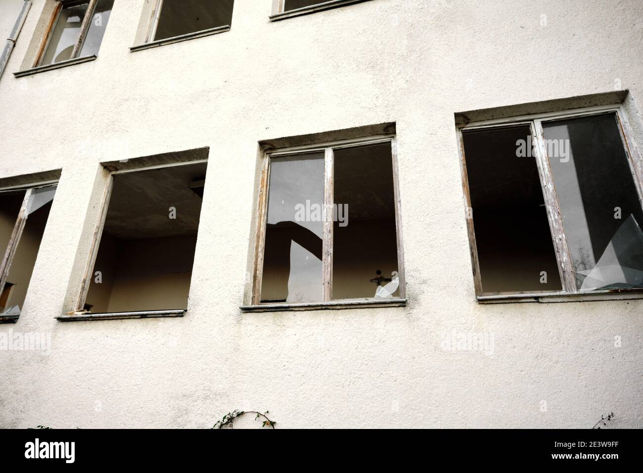 Broken windows old type wood windows. Old brownfield and abandoned ...