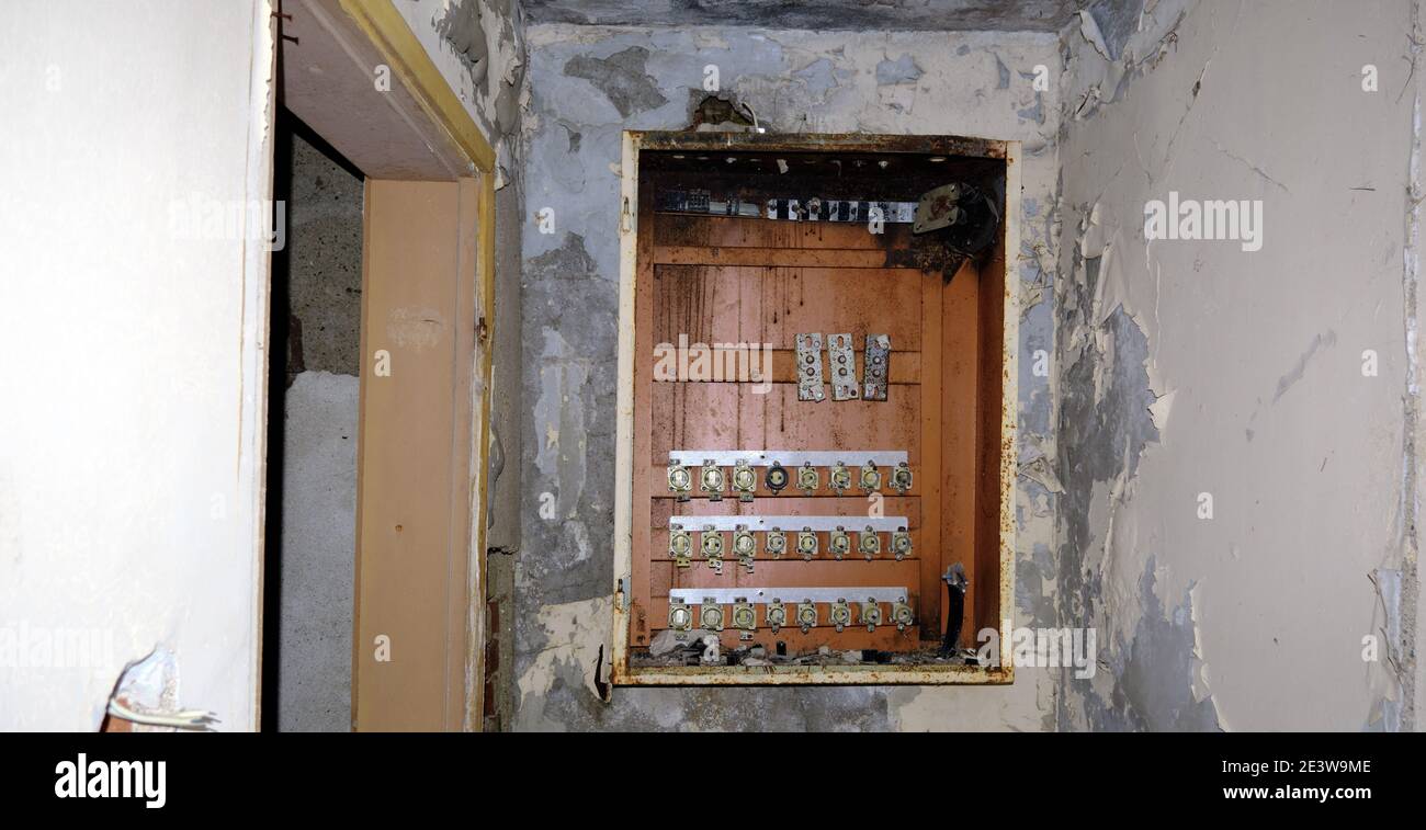 Old retro vintage style and dirty yellow electrical contact breaker and ...