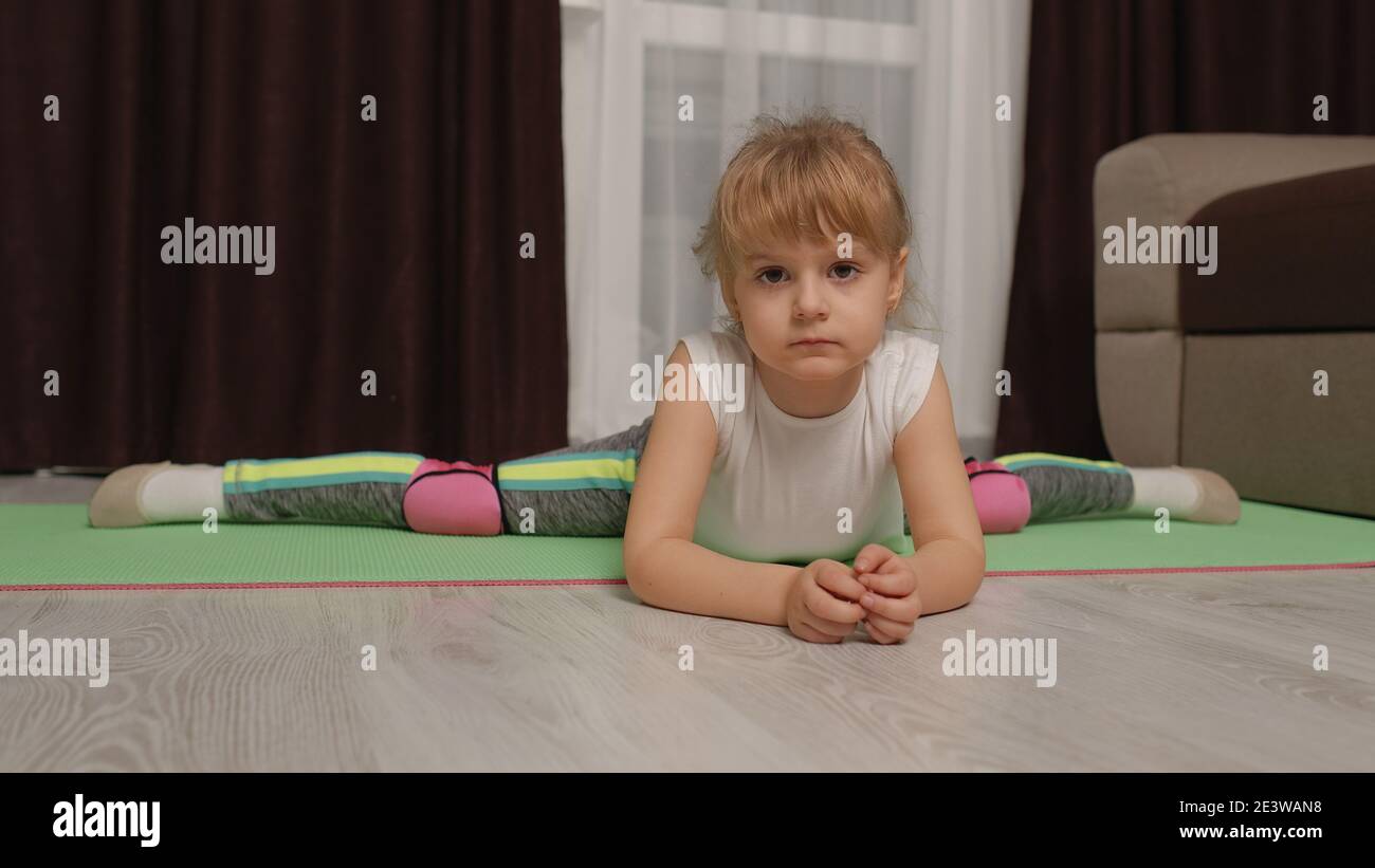 Fit little child kid training gymnastics fitness twine stretching ...