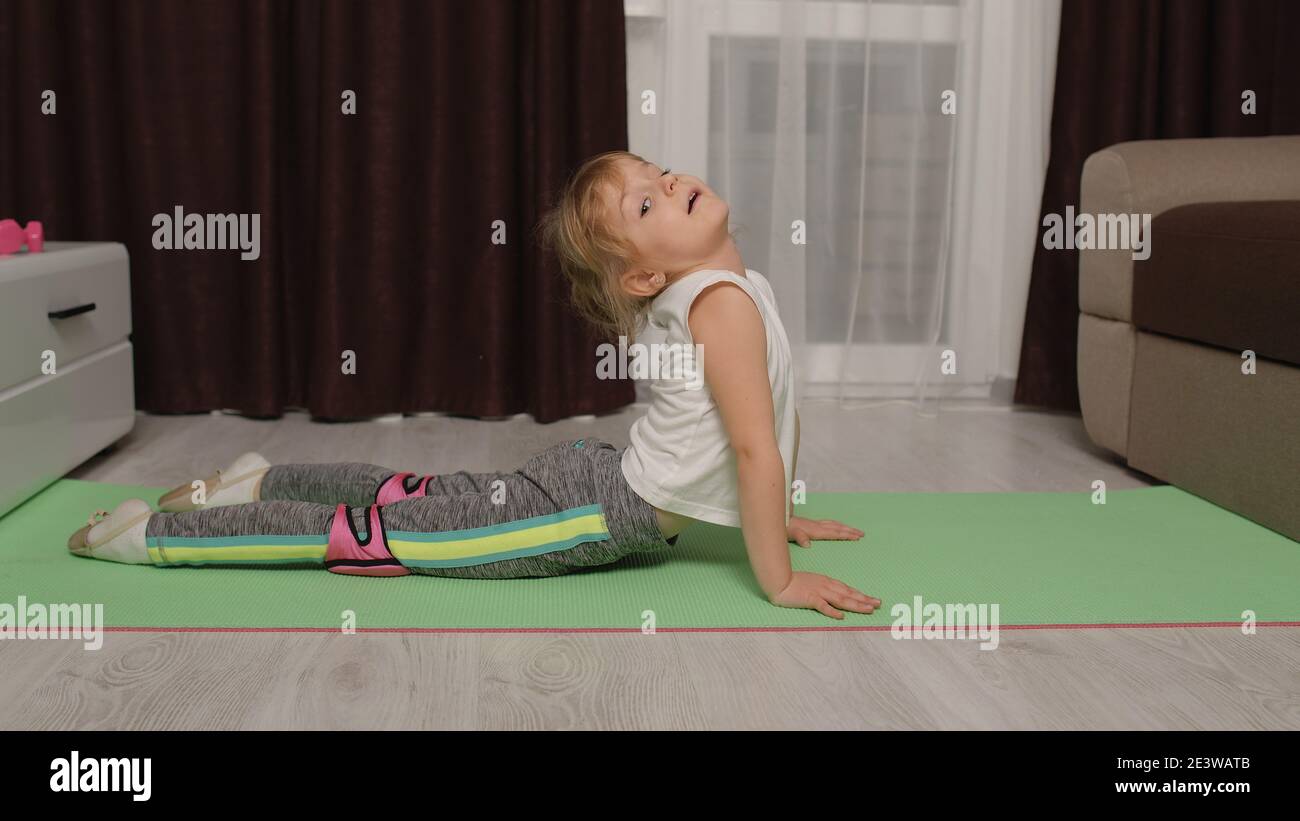 Fit little child kid training gymnastics fitness stretching workout ...