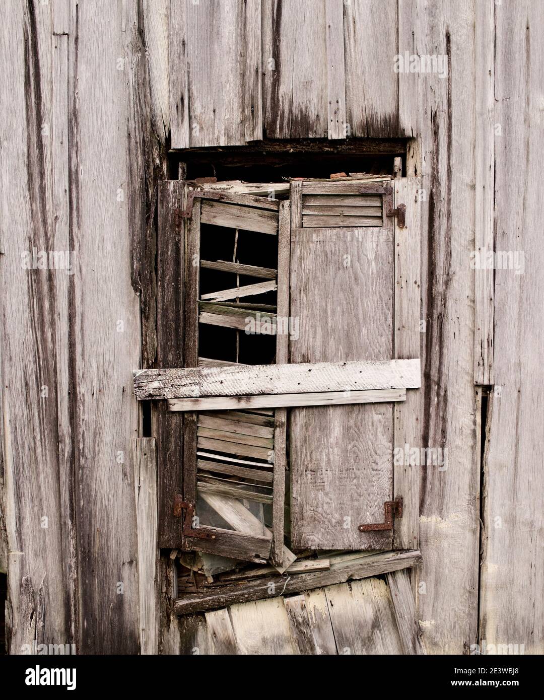 Old wood shutters, weathered, aging in condemned house in Key West, FL ...