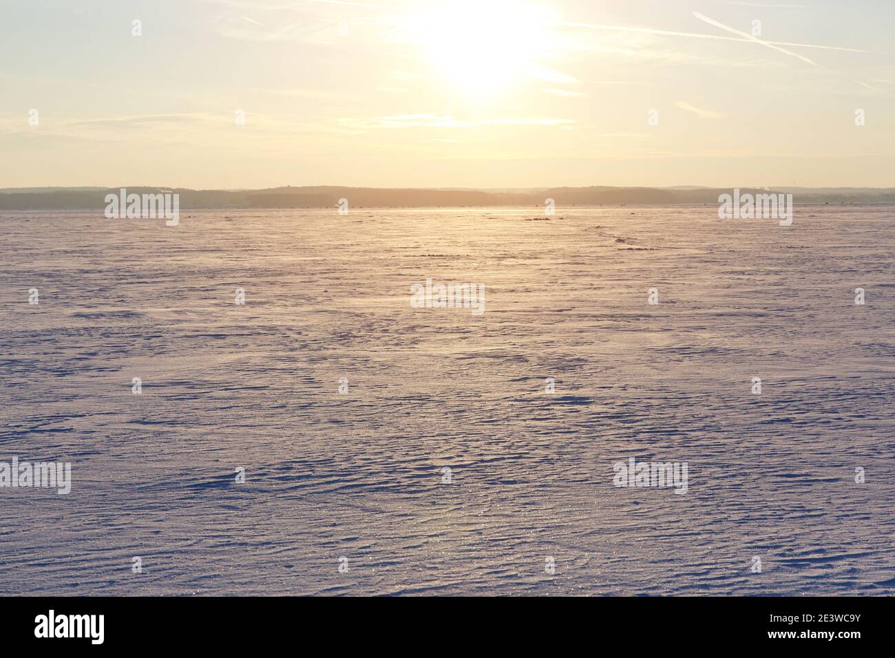 Winter field at sunset background. Snow texture close up Stock Photo ...