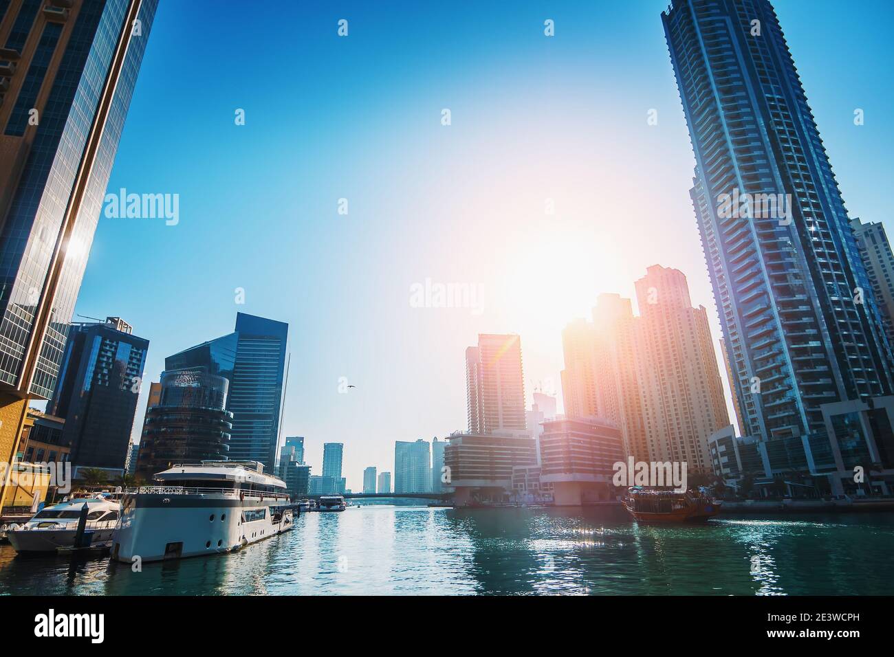 Dubai Marina water canal with high buildings and boats, United Arab ...