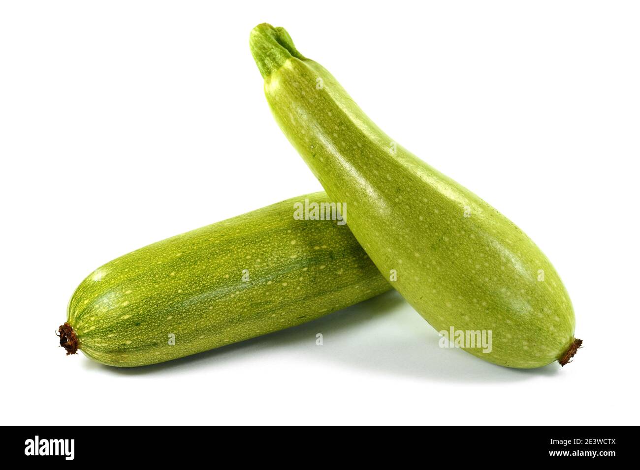 fresh green zucchini isolated on white background Stock Photo - Alamy
