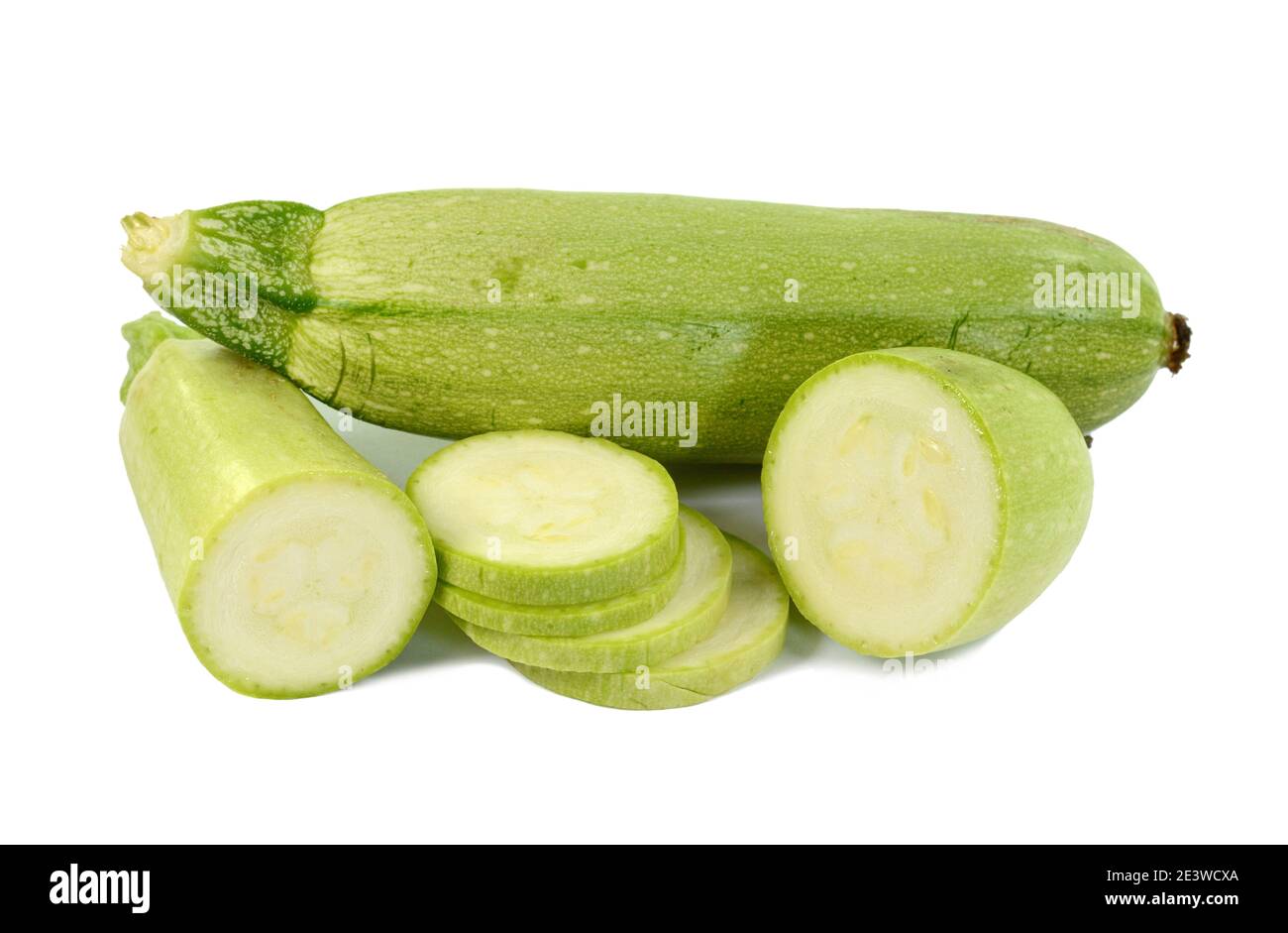 fresh green zucchini isolated on white background Stock Photo - Alamy