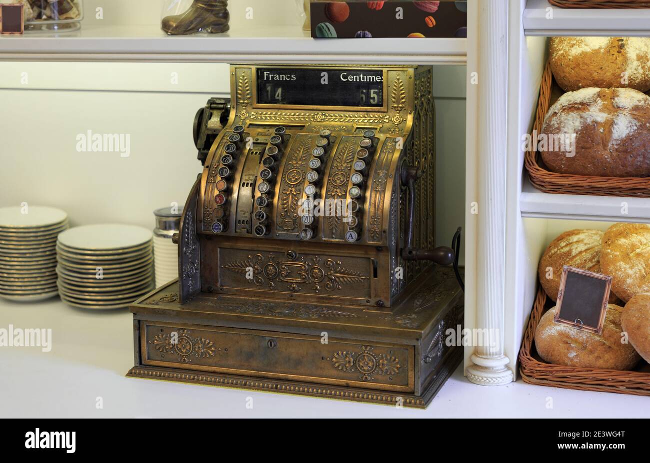 Antique cash register, on a shop window Stock Photo - Alamy