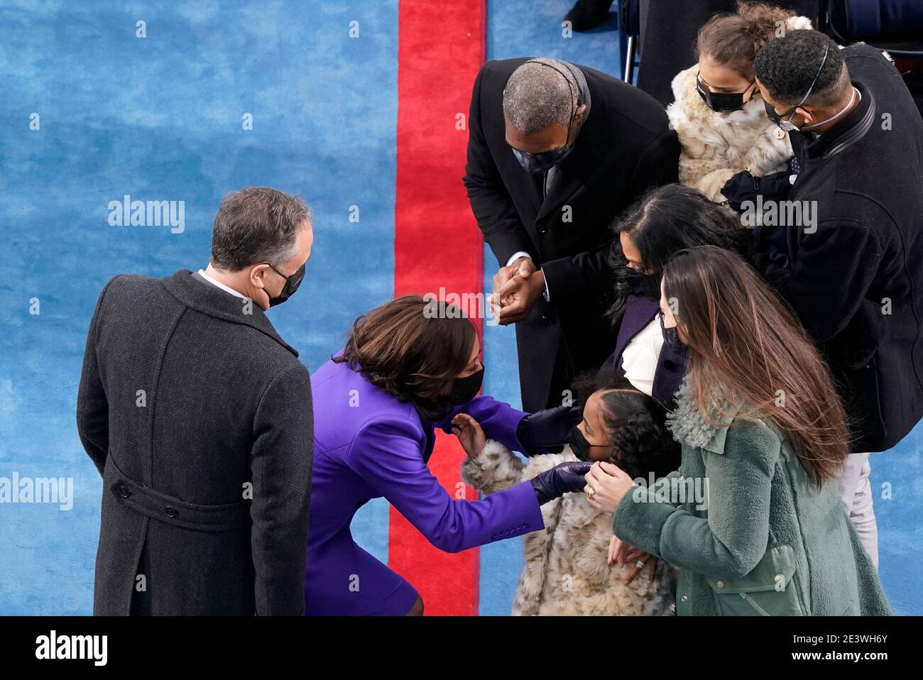 Vice President-elect Kamala Harris and her husband Doug Emhoff, stop to ...
