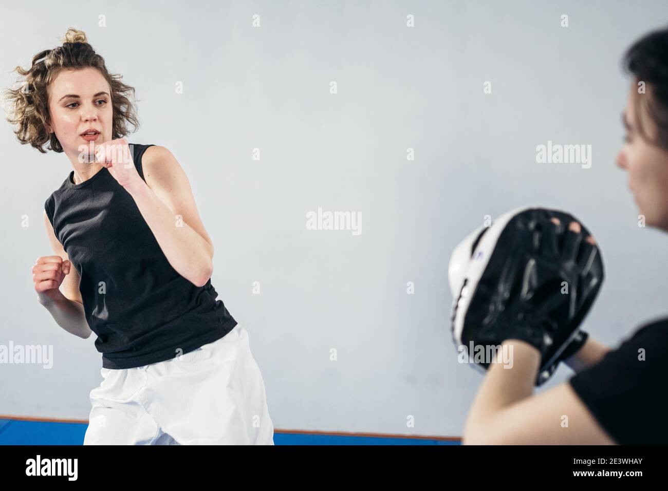 Woman Kicking Leg Up High Resolution Stock Photography and Images - Alamy