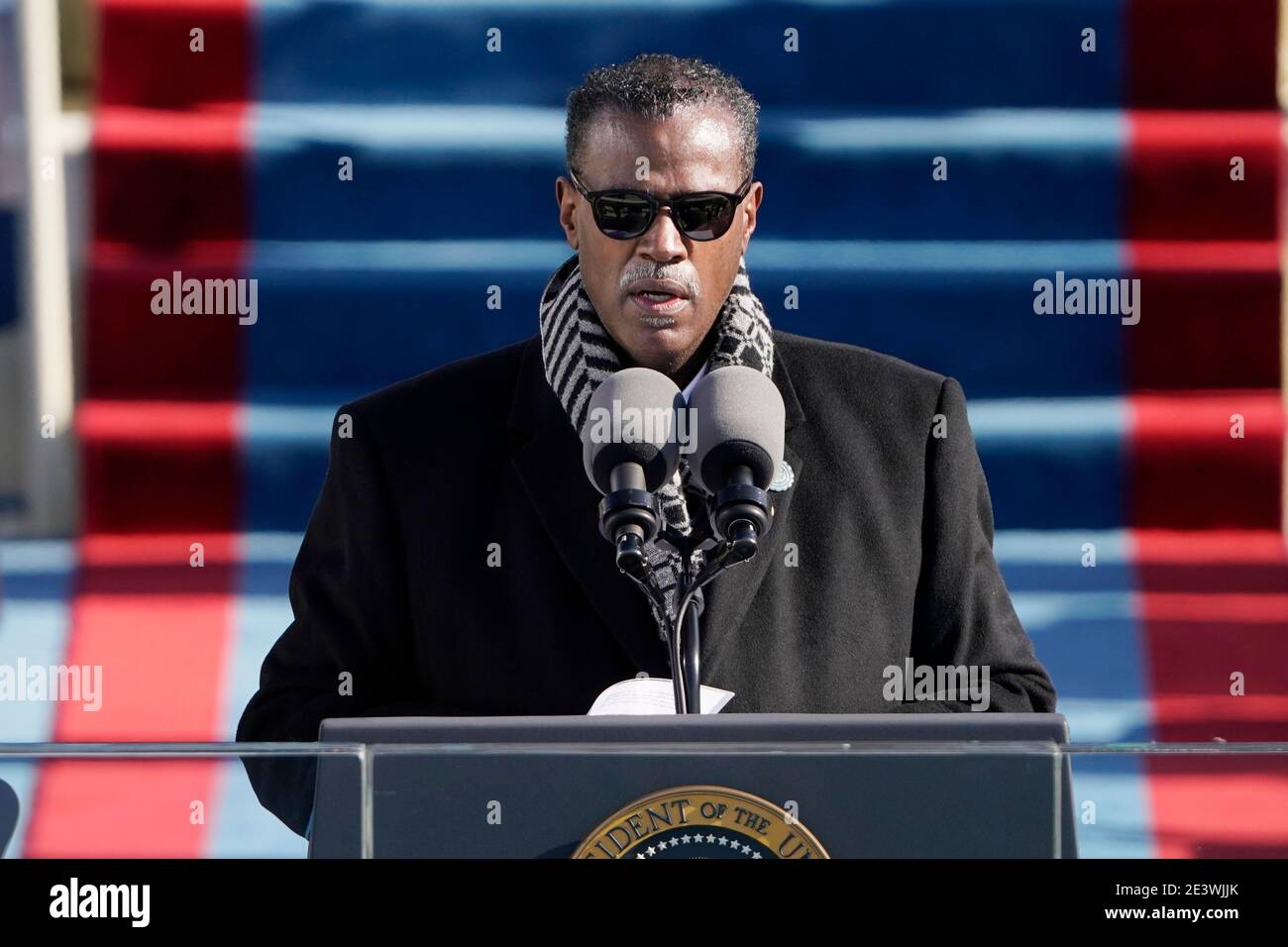 Rev. Silvester Beaman gives the benediction during the 59th ...