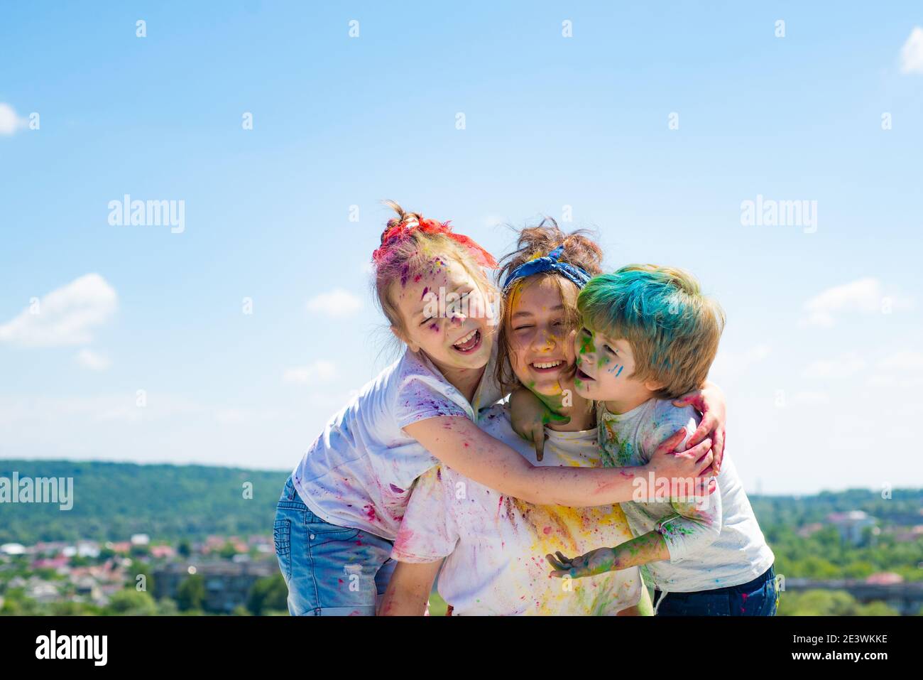 Portrait of a happy laughing hugging children. Portrait of a positive ...