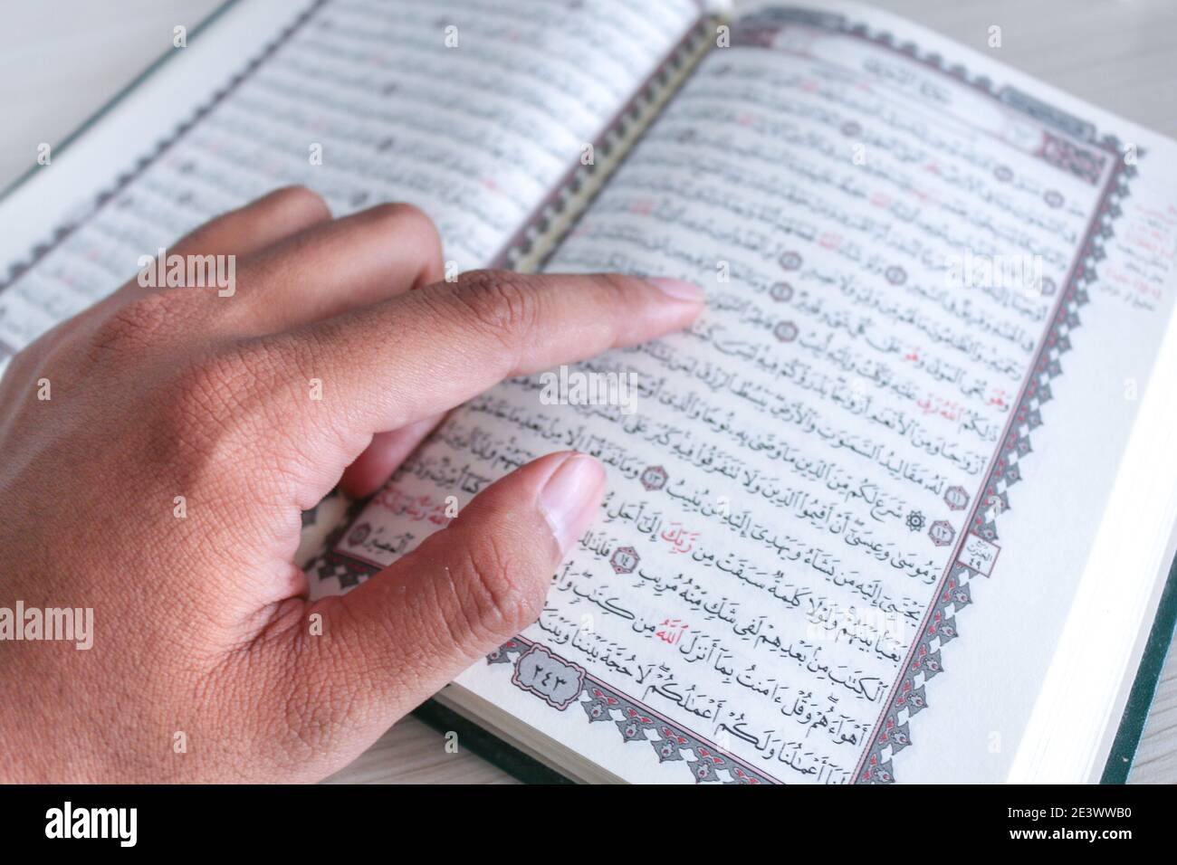 Hand quran reading hi-res stock photography and images - Alamy