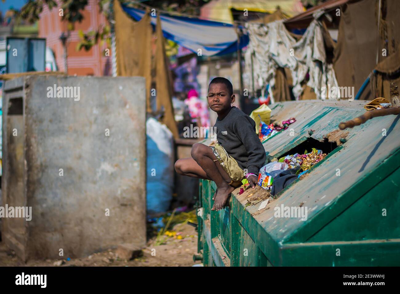 Rajasthan. India. 07-02-2018. Child collecting garbage on the street ...