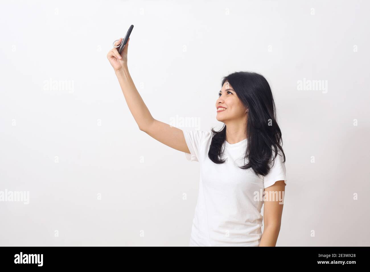Smiling Lovely Active Asian Girl Taking Selfie Photo Isolated On White
