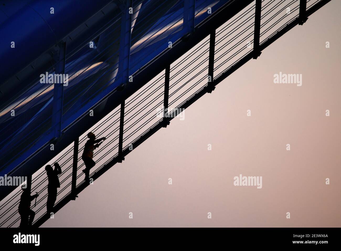 Beijing, China. 19th Jan, 2021. Maintenance workers work on Xixi River ...