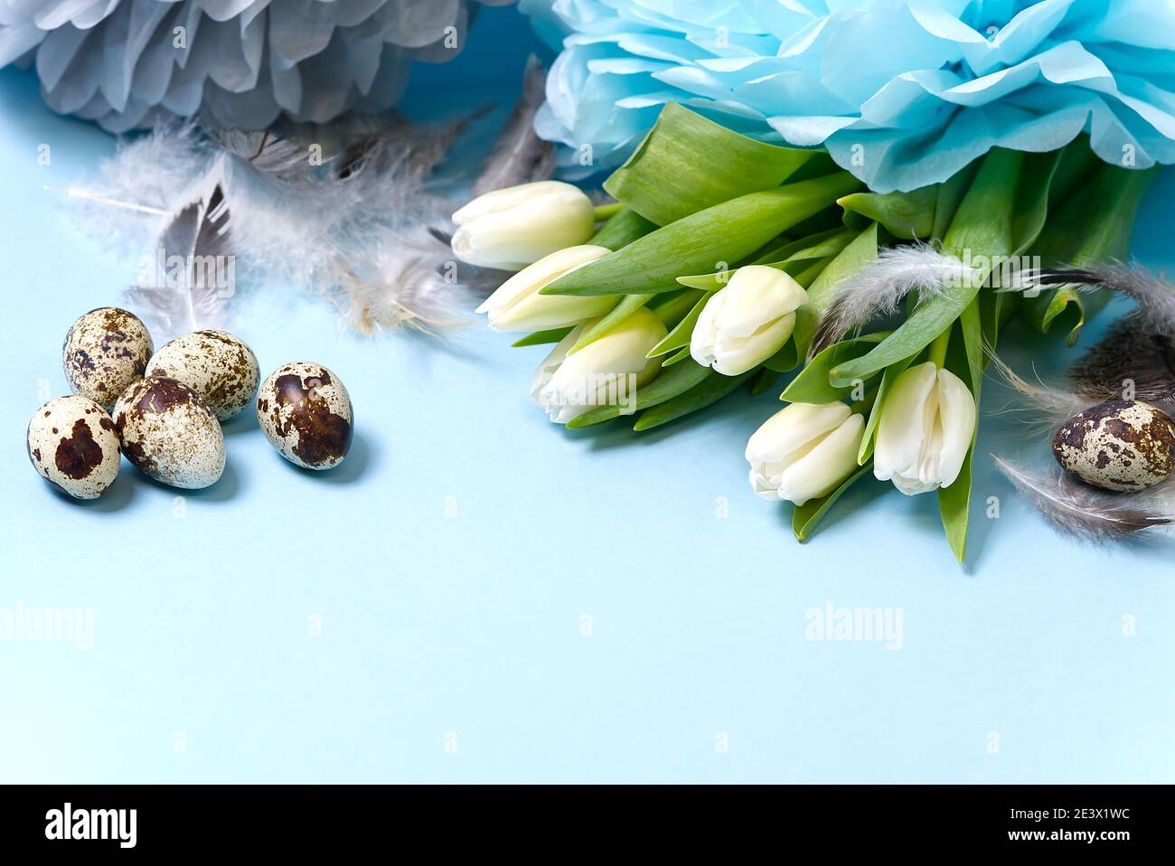 Easter background with eggs and white tulips Stock Photo - Alamy