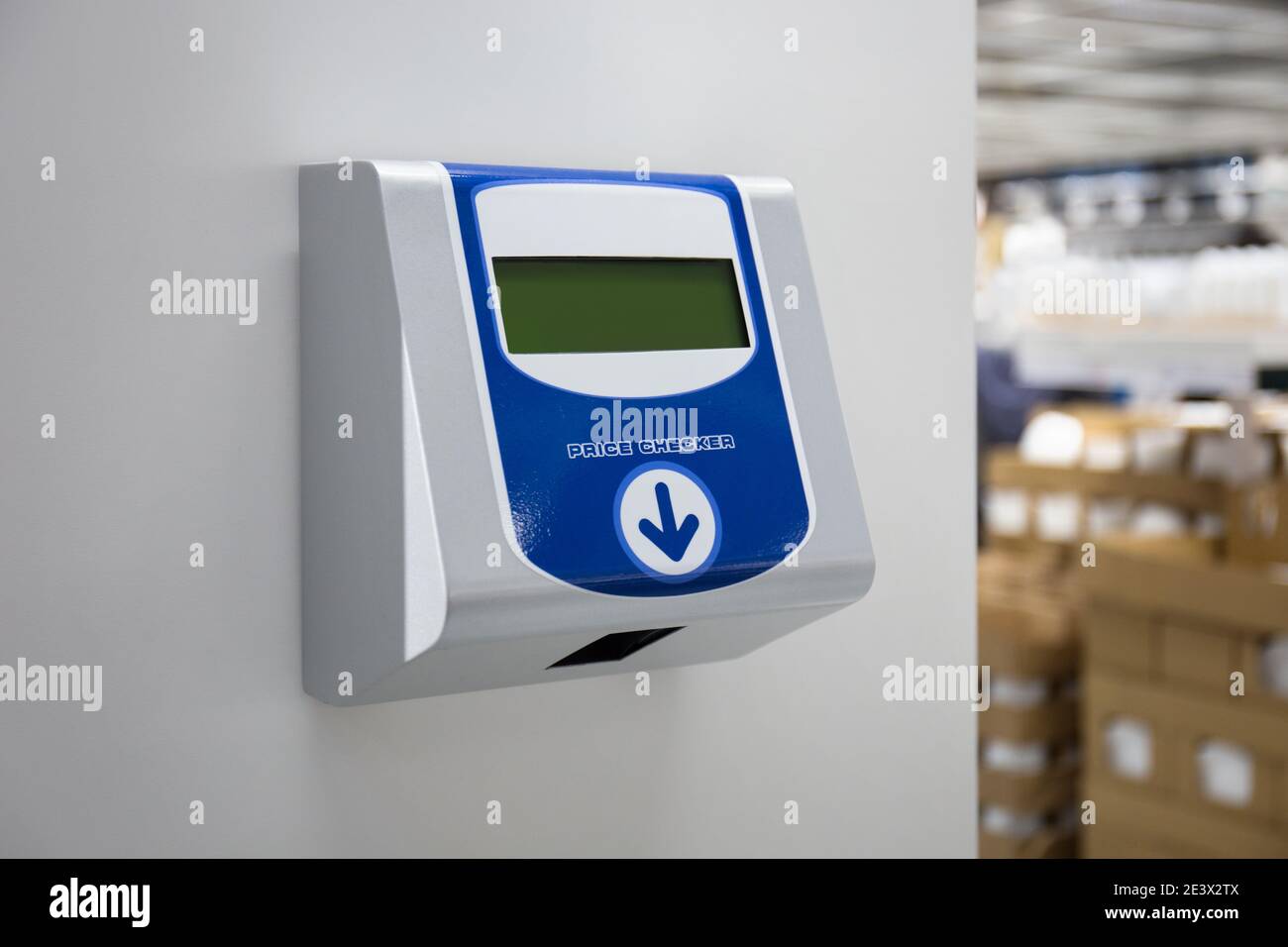 Price check machine on wall Stock Photo - Alamy