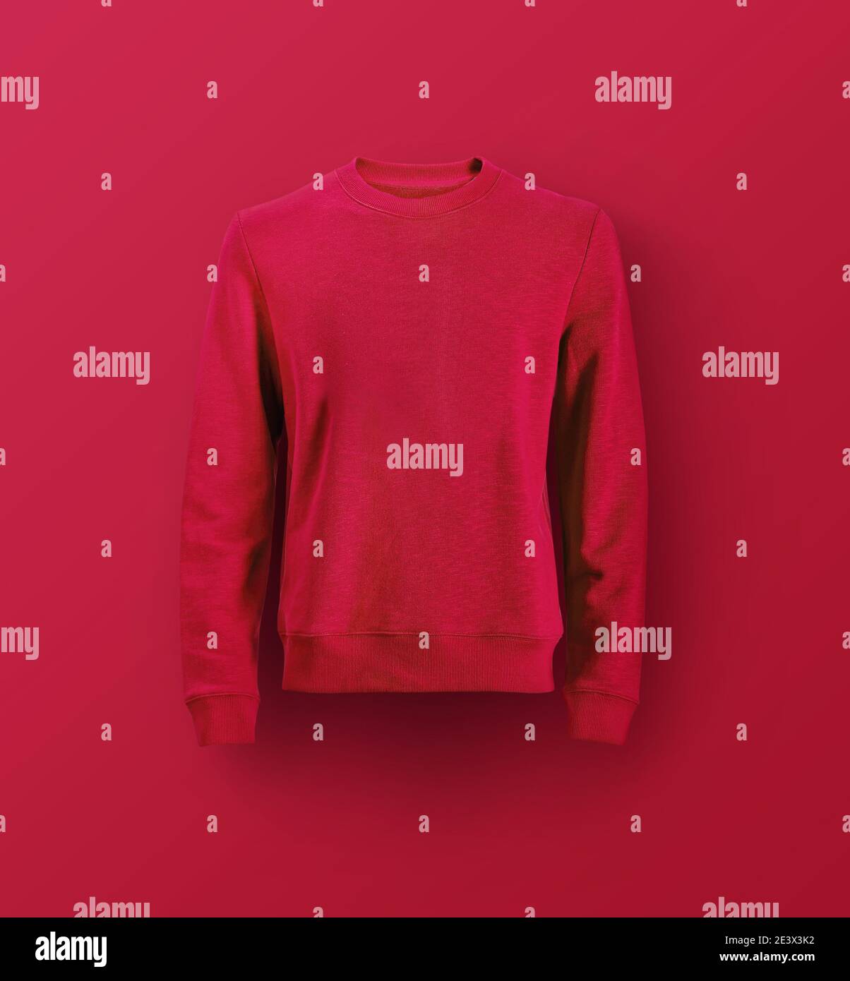 Men's red color long sleeve t-shirt on red color background Stock Photo ...