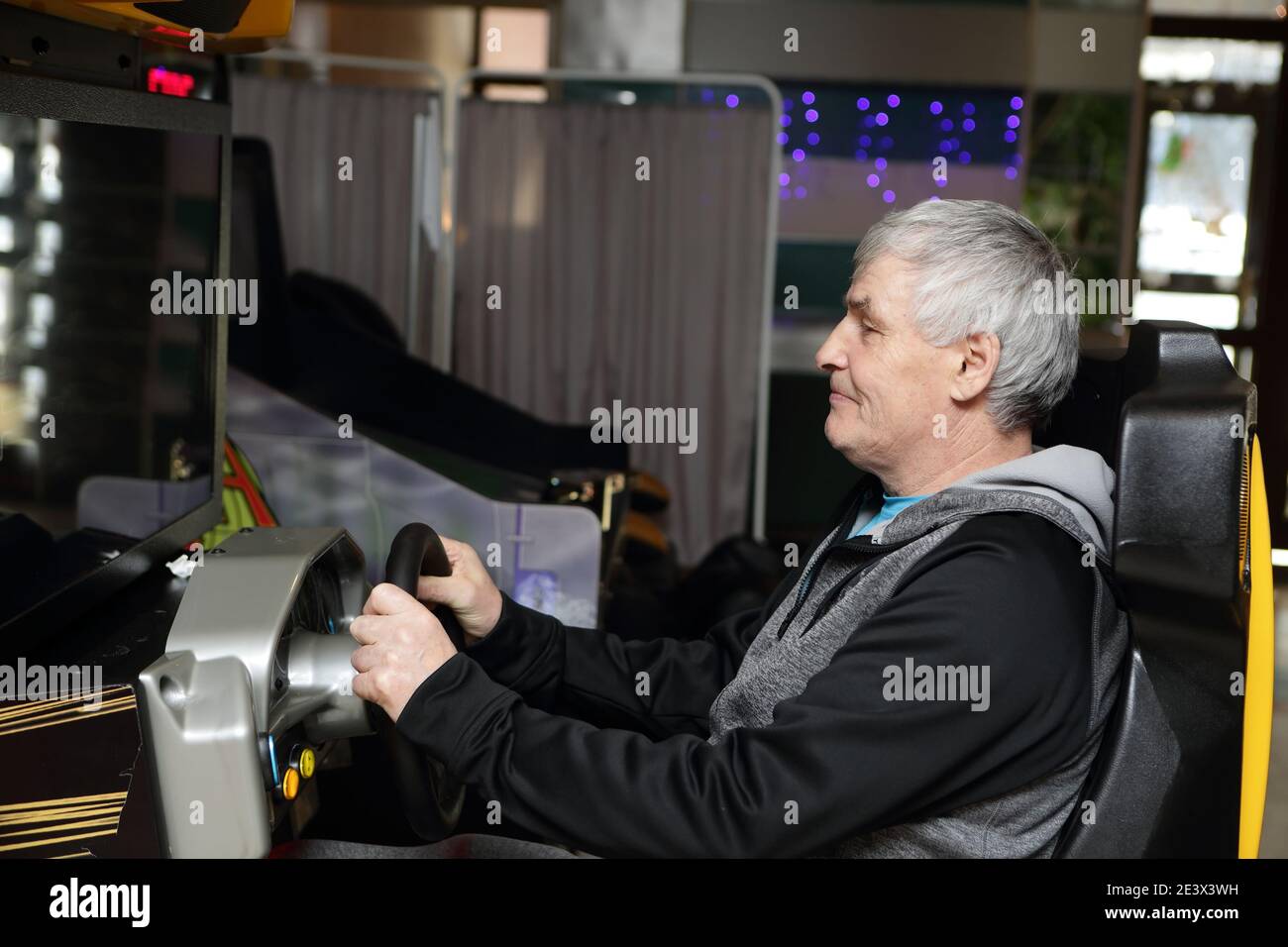 Amusement arcade senior hi-res stock photography and images - Alamy