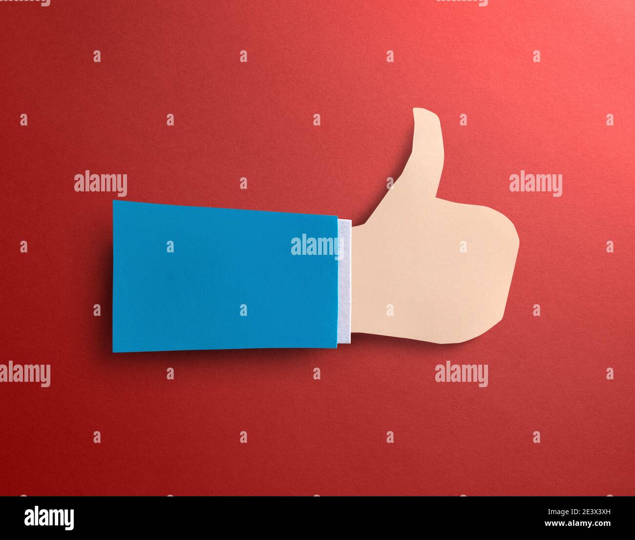 Thumbs up paper craft with shadow on red background Stock Photo - Alamy