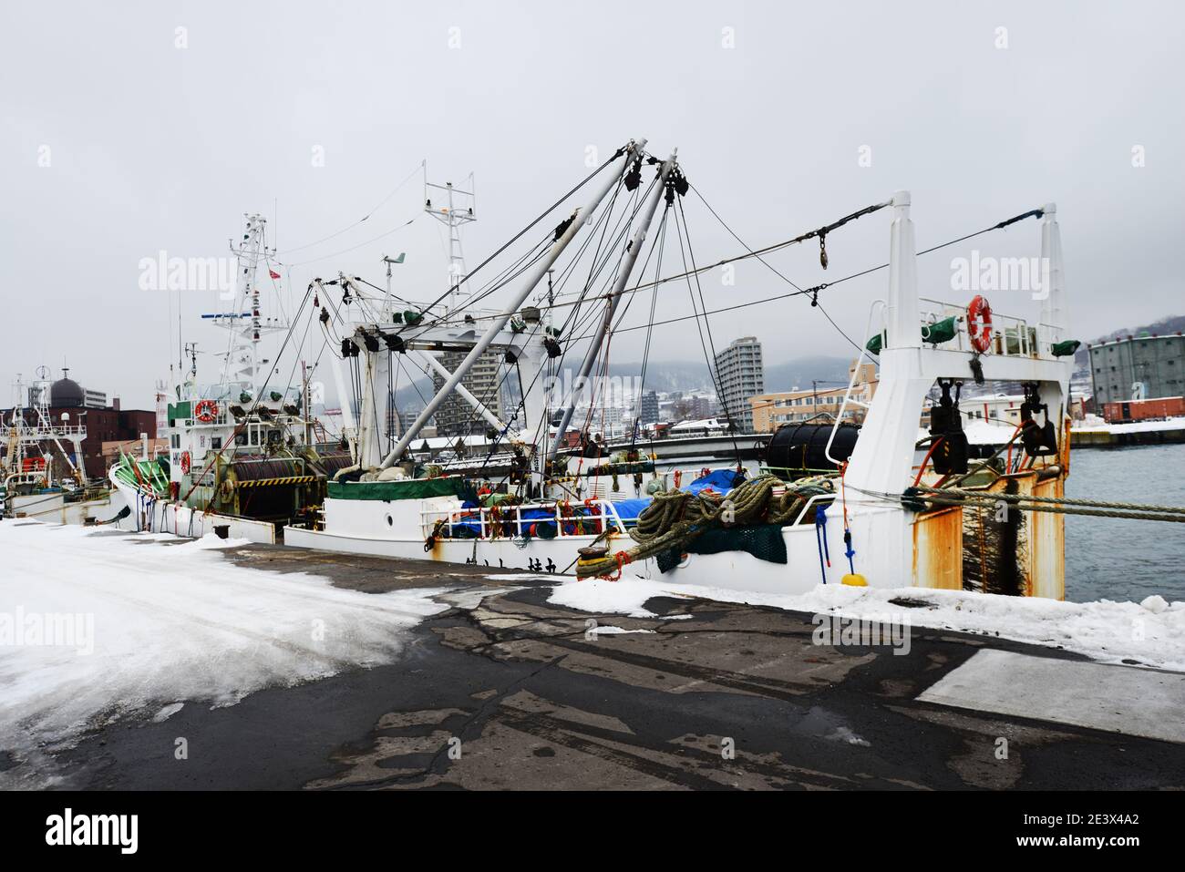 Fishing boats docking at the port of Otaru in Hokkaido, Japan Stock ...