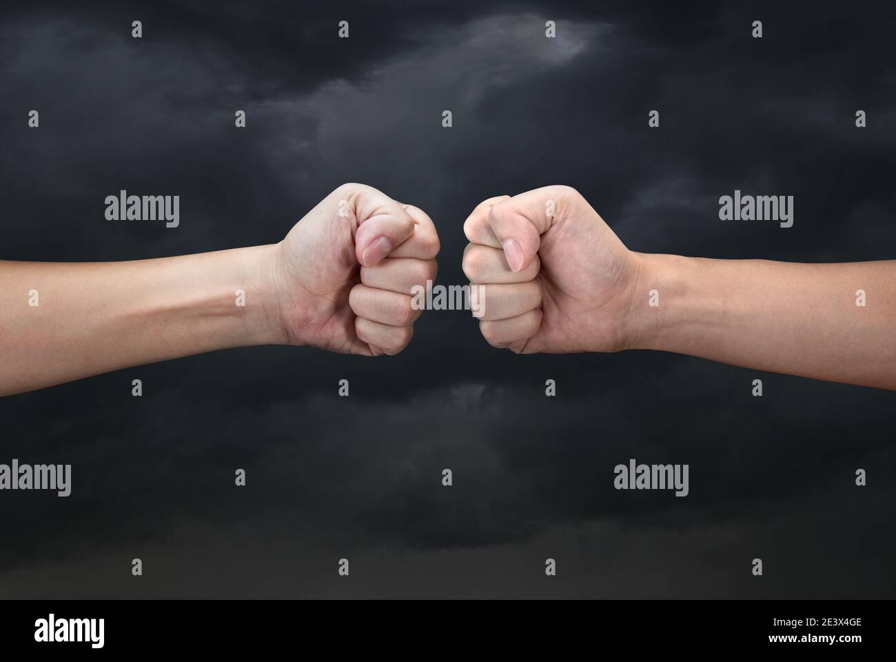 Conflict Concept - Two Fists In Impact Stock Photo - Alamy