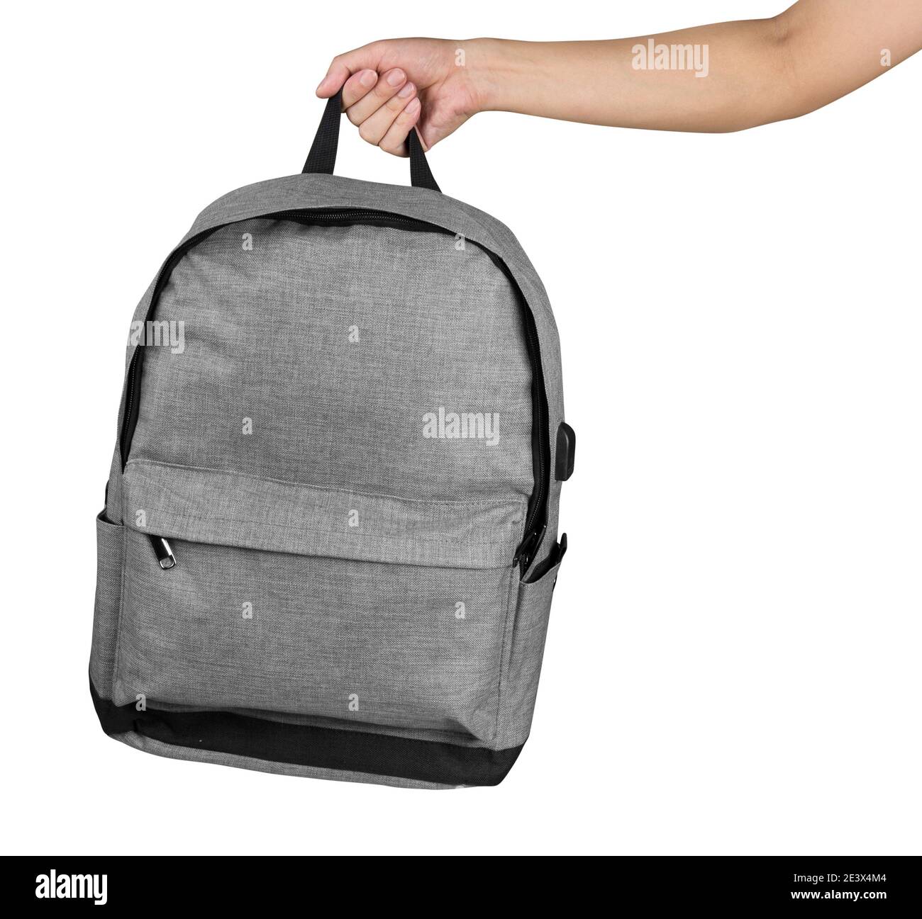 Hand holding grey colour backpack isolated over white background Stock ...