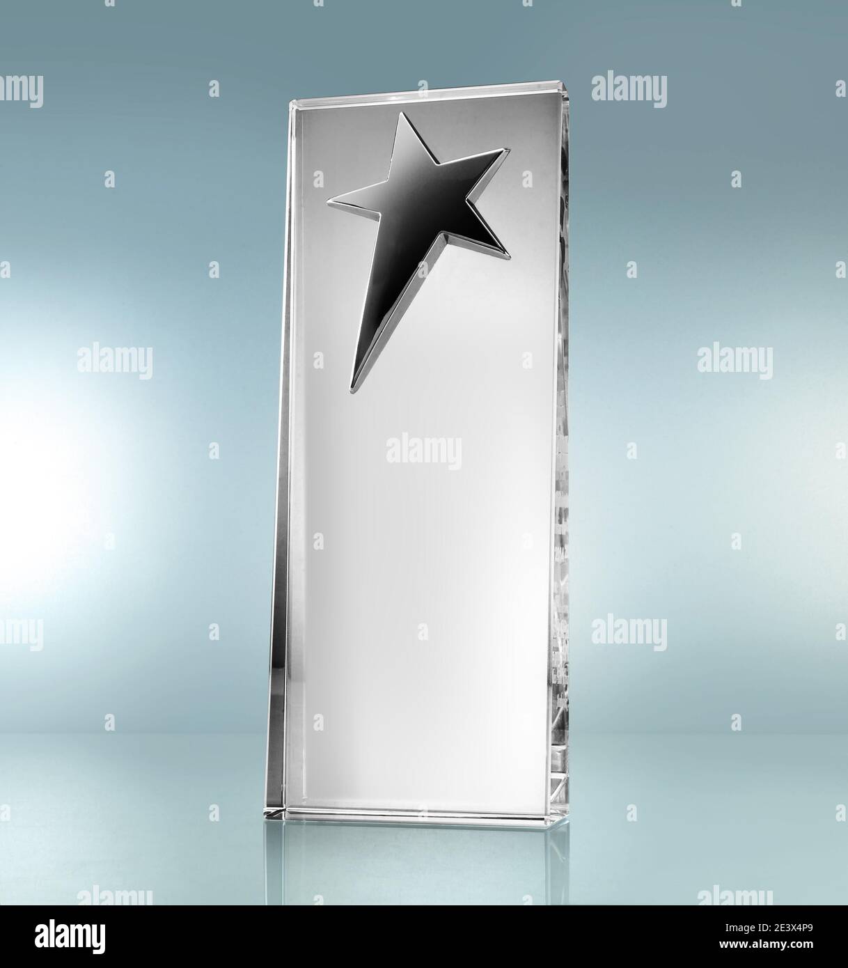 Glass trophy with star shape on white background Stock Photo - Alamy
