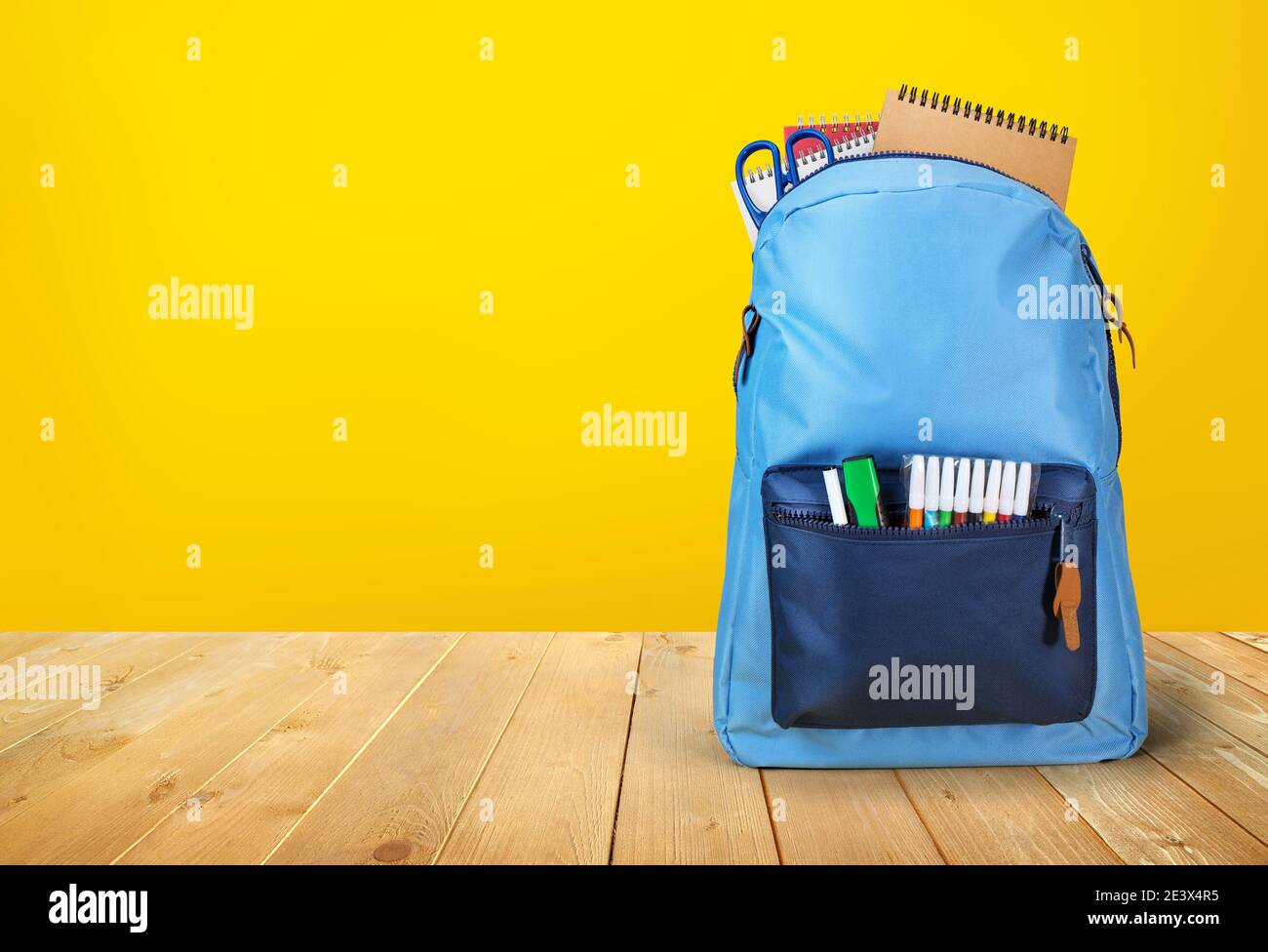 School bag backpack with notebooks on wodden table Stock Photo - Alamy