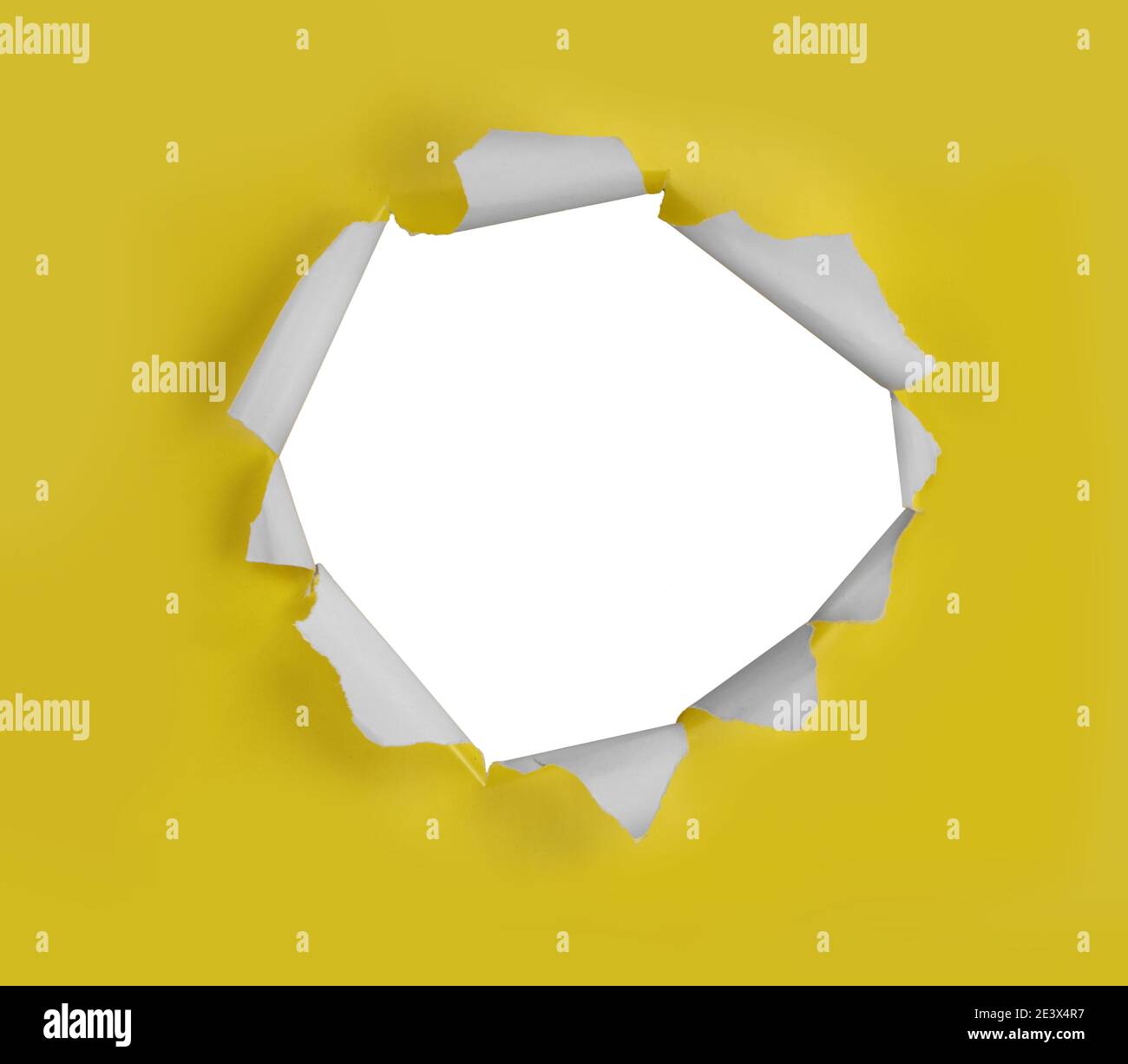 Yellow Torn Paper hole Stock Photo - Alamy