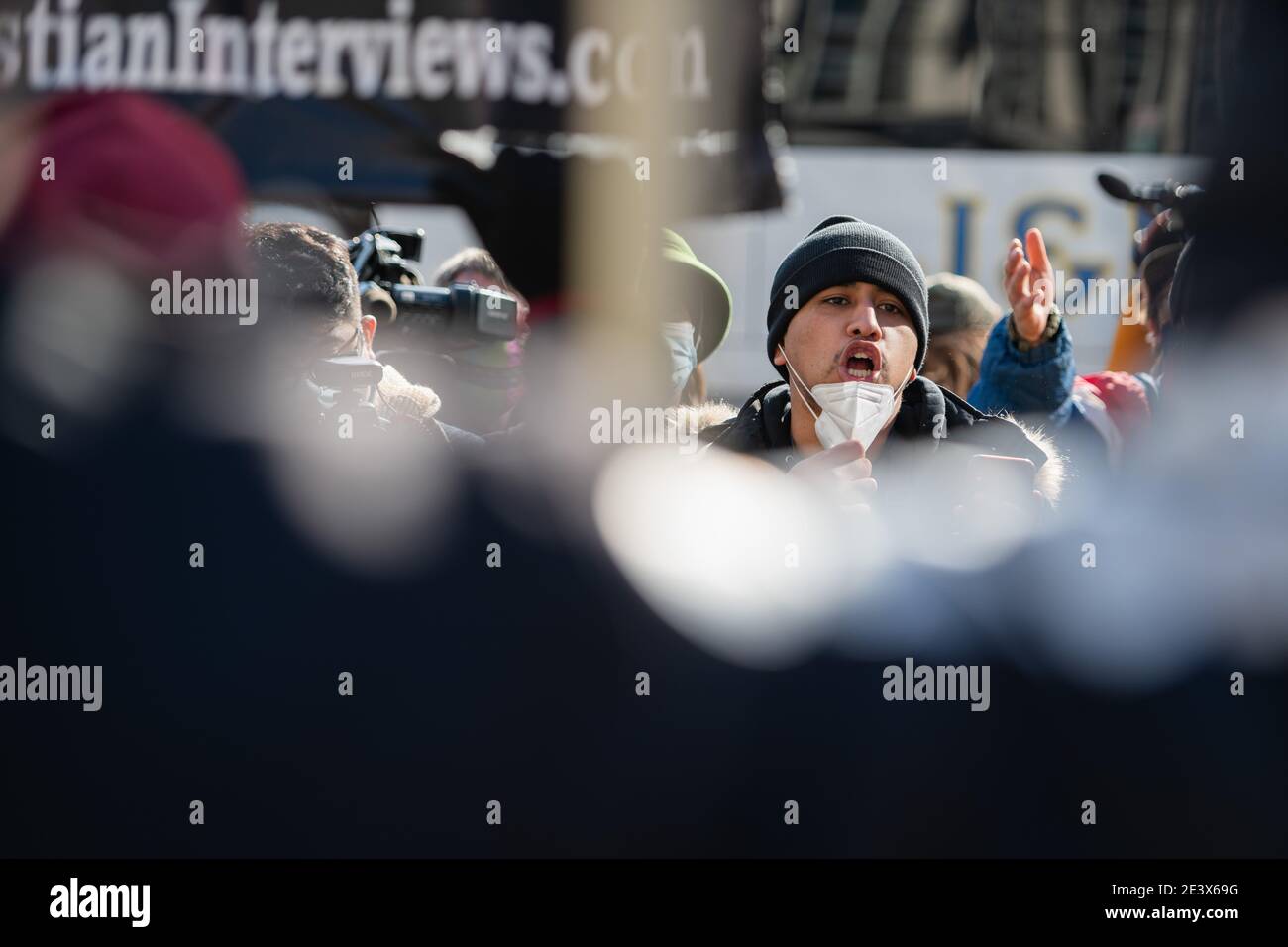 Washington Dc, Washington DC, USA. 20th Jan, 2021. A man removes his ...