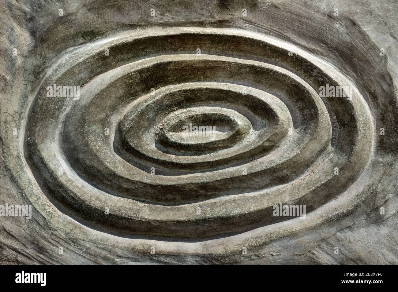 Round relief pattern in gray stone Stock Photo - Alamy