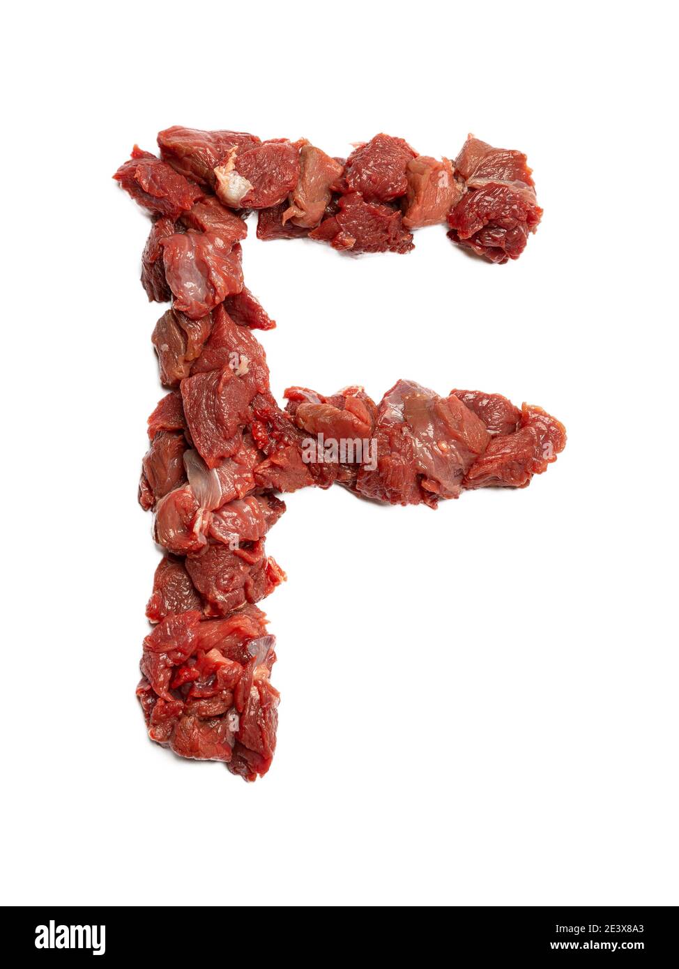 Letter F of the English alphabet from cuts of beef on a white isolated ...