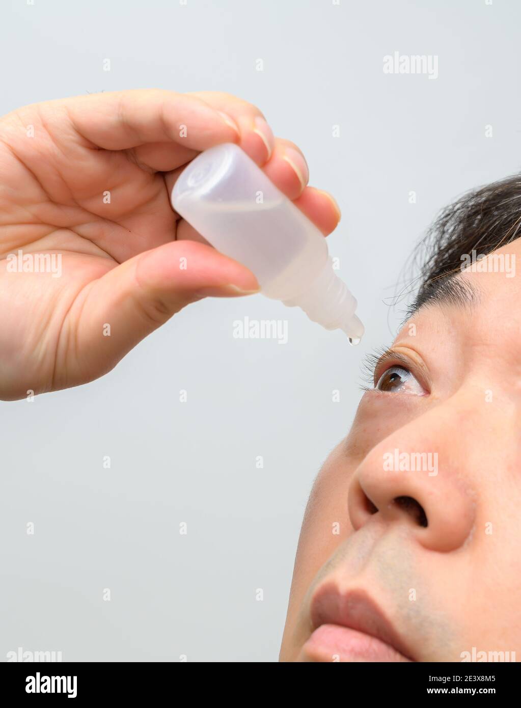 Close-up Of A Mature Man Putting Eye Drops In Eyes Stock Photo - Alamy