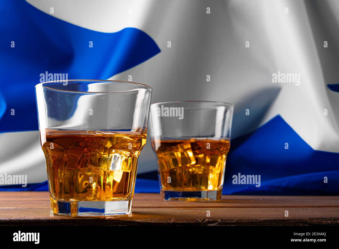 Glass of Scottish whisky against national flag of Scotland Stock Photo ...