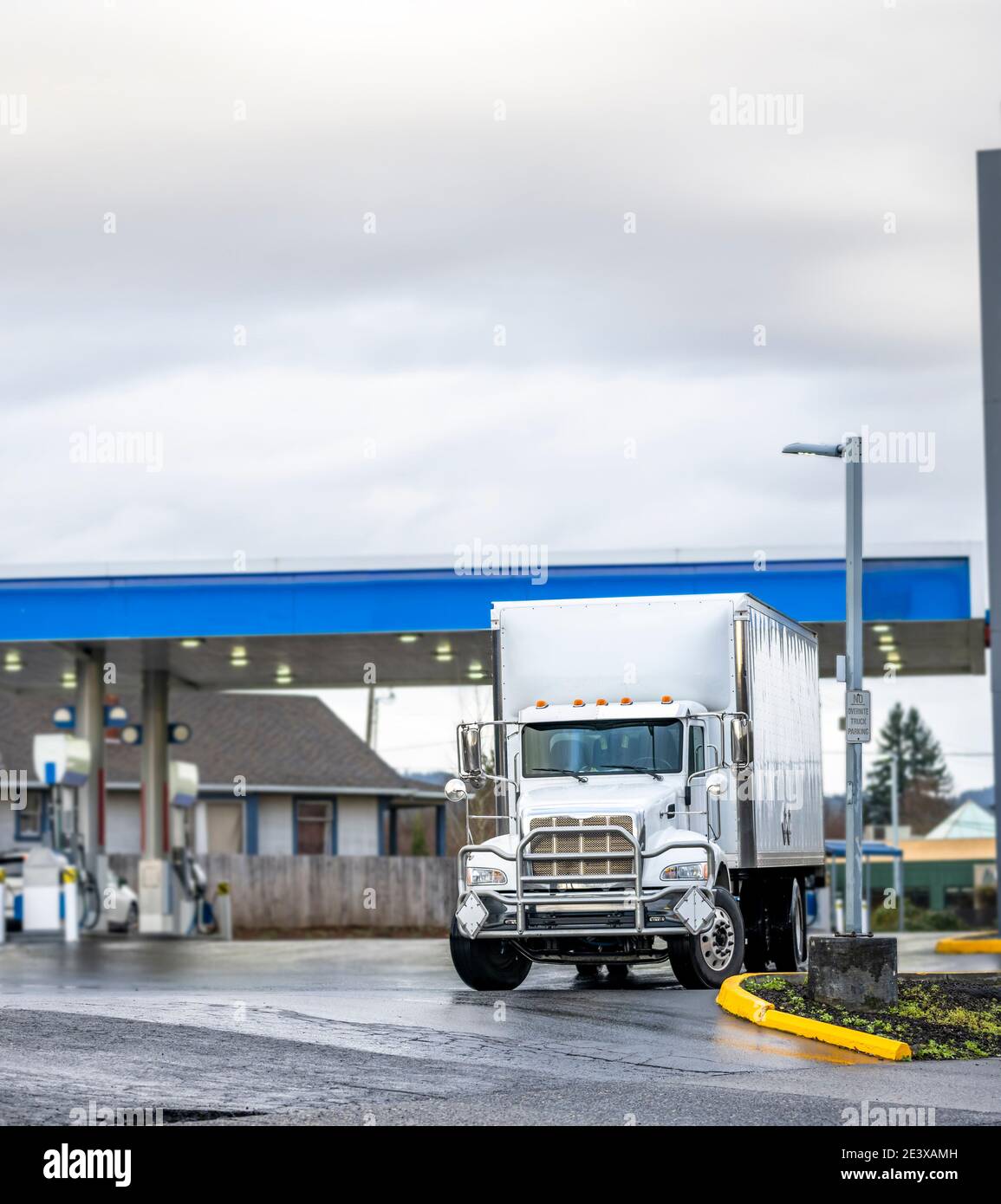 Big rig white day cab commercial semi truck for local deliveries with ...