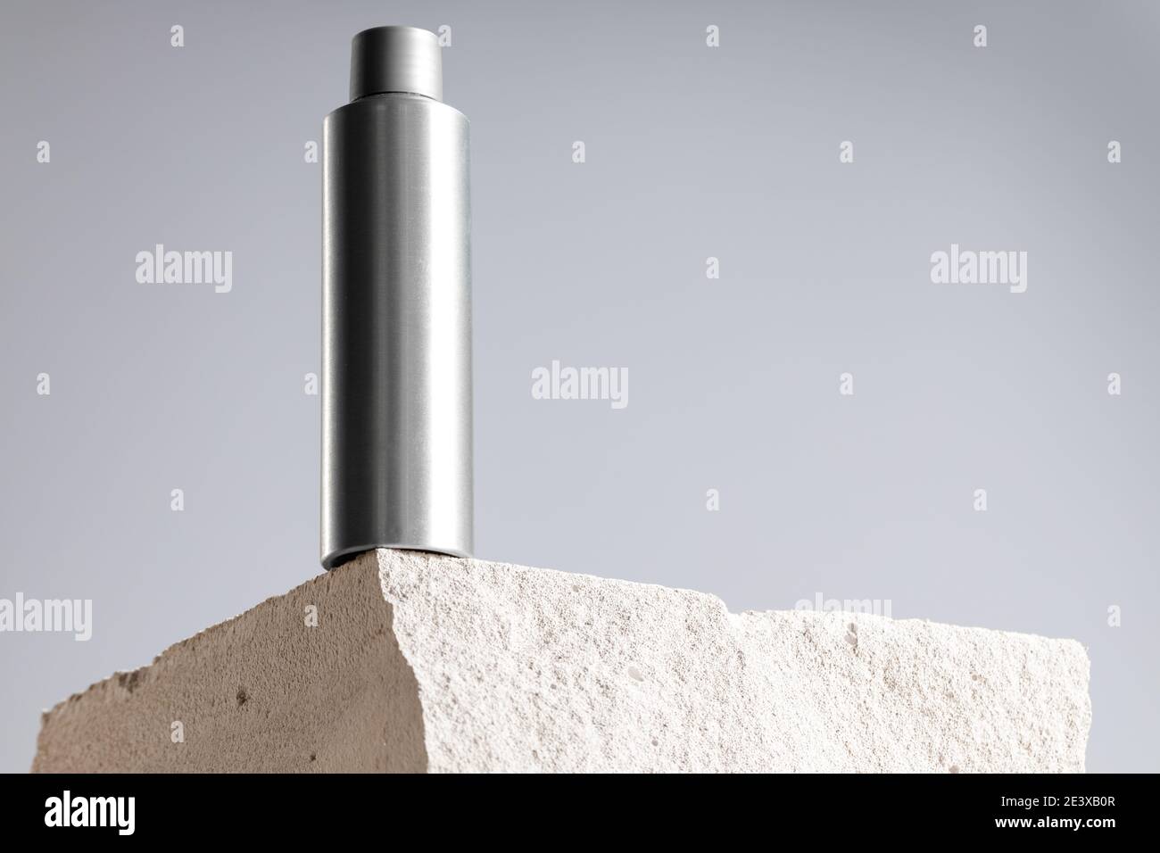 Cosmetic jar on gray cinder block close up Stock Photo - Alamy