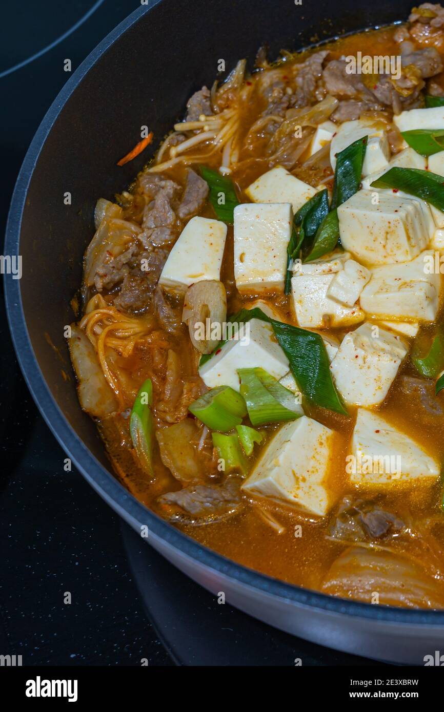 Vertical photo of spicy Korean Kimchi Jjigae soup . High quality photo ...