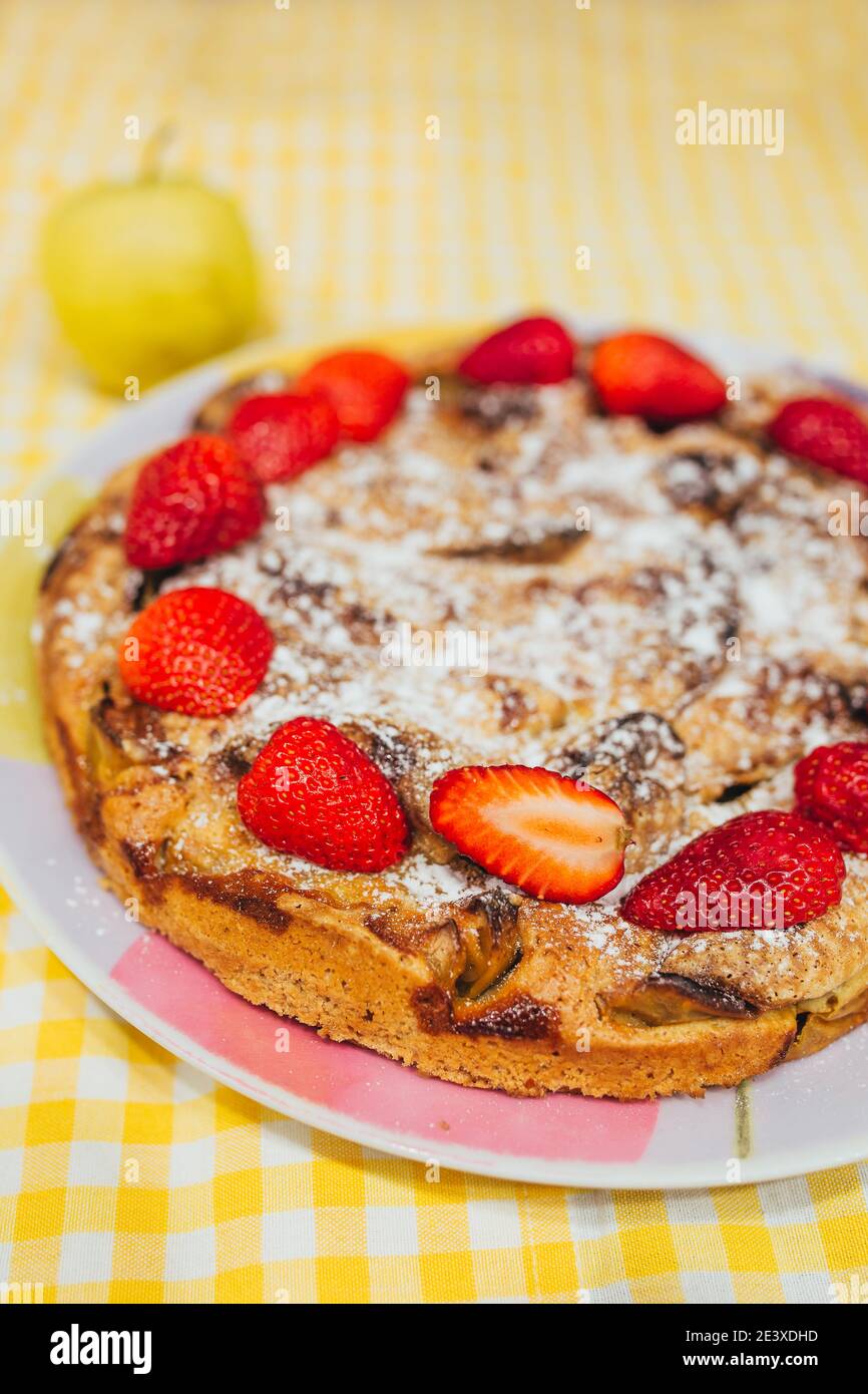 Charlotte pie with apples - golden brown and topping with icing sugar ...