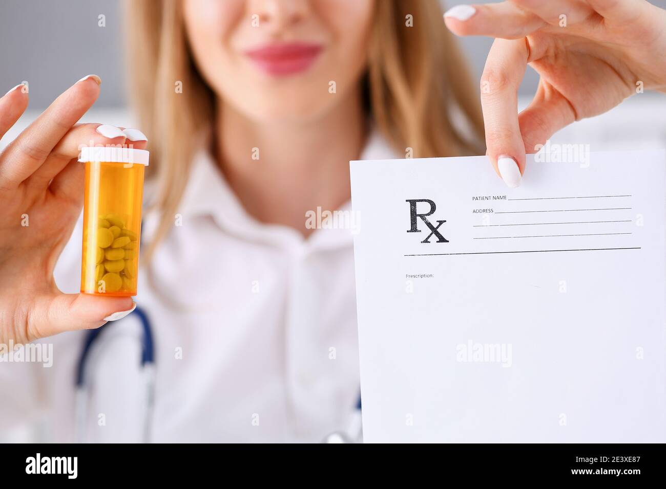 Female doctor hands hold prescription Stock Photo - Alamy