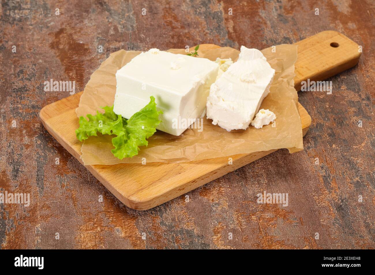 Greek traditional Feta soft cheese in the plate Stock Photo - Alamy