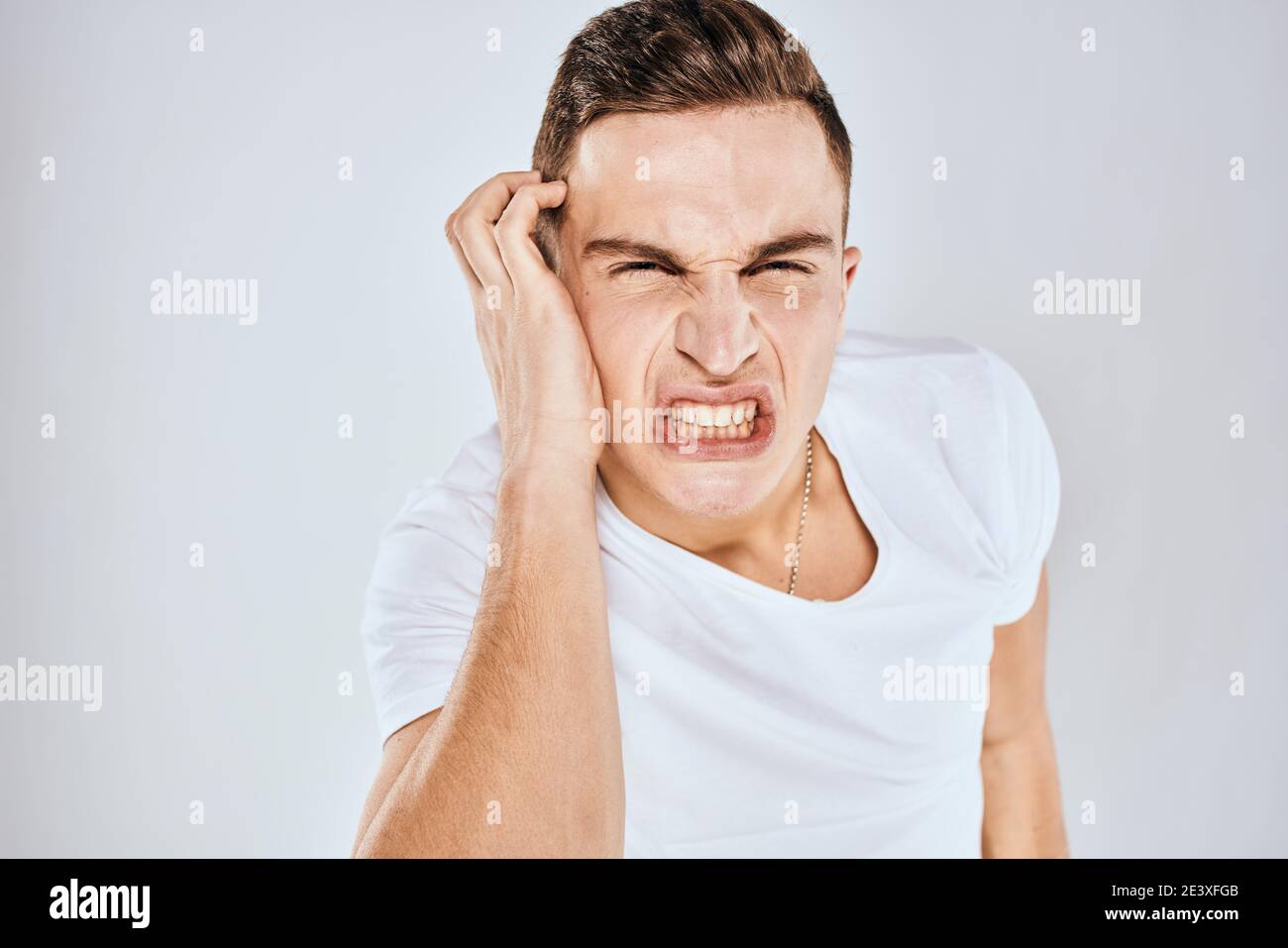 emotional man gesturing with his hands displeased facial expression ...