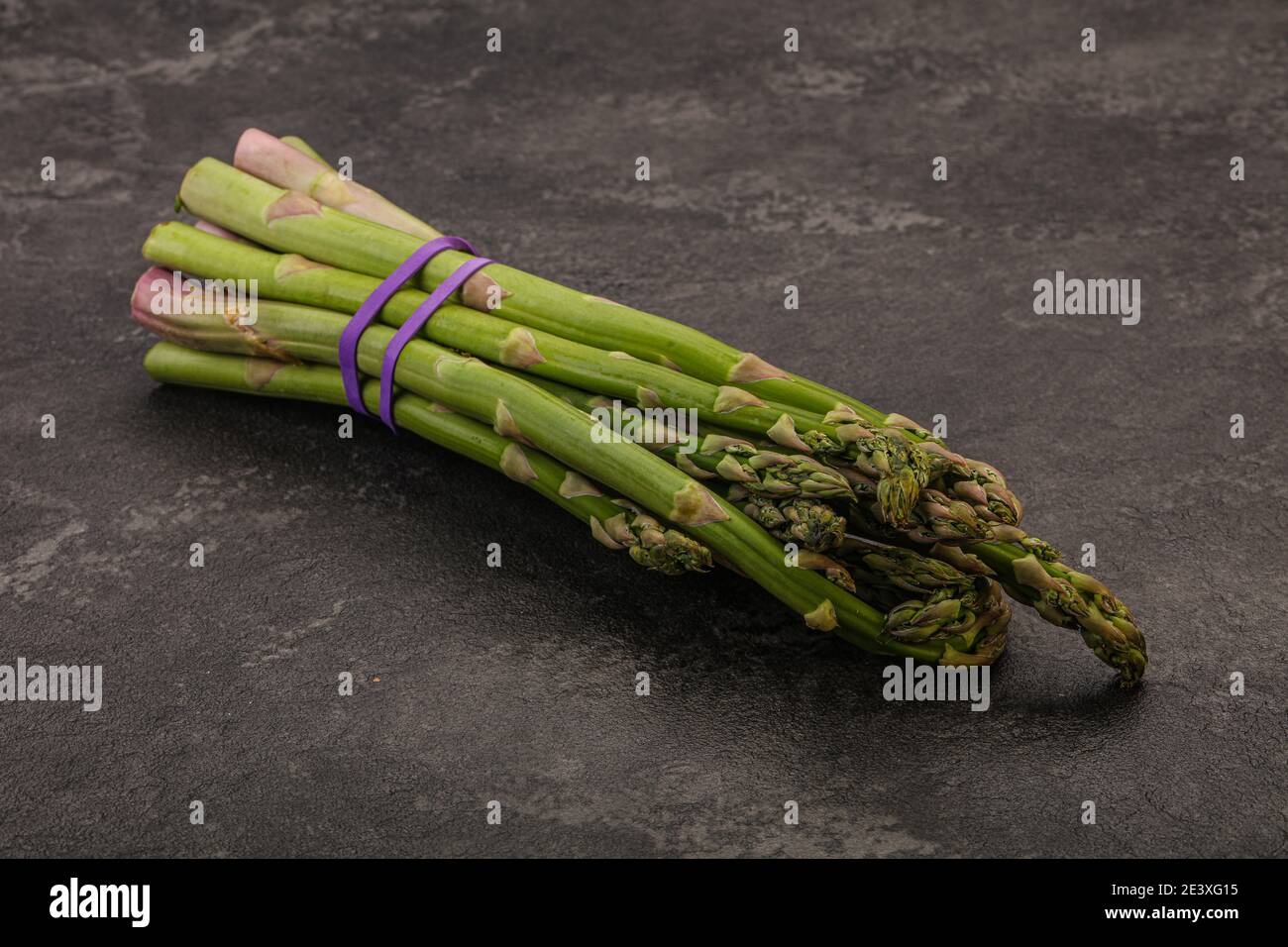 Vegan cuisine - Raw asparagus heap for cooking Stock Photo - Alamy