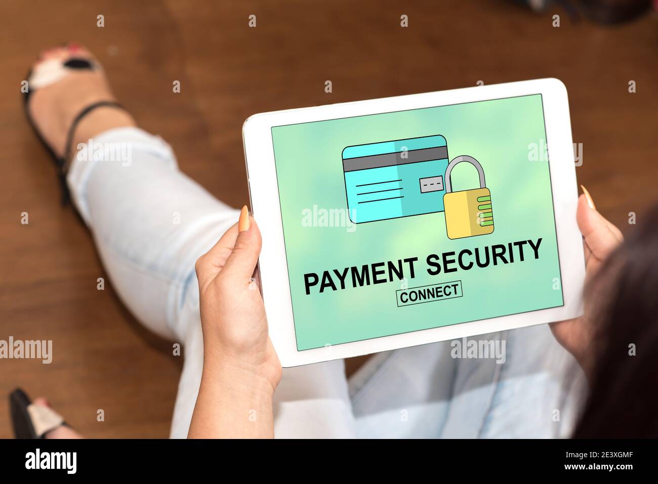 Tablet screen displaying a payment security concept Stock Photo - Alamy