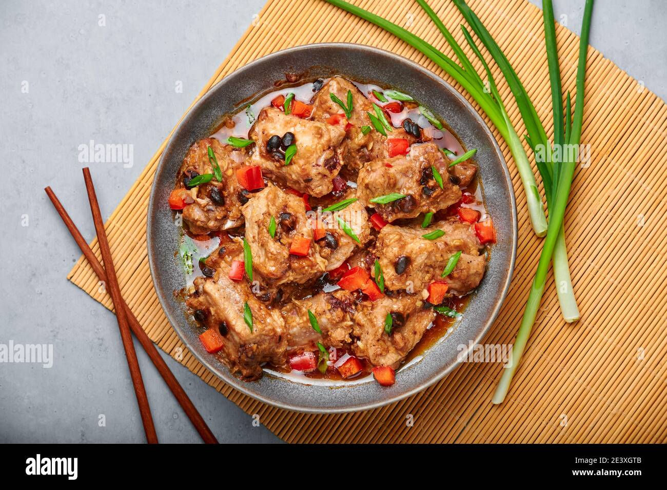 Dim Sum Pork Spare Ribs or Pai Guat in gray bowl on dark concrete table ...