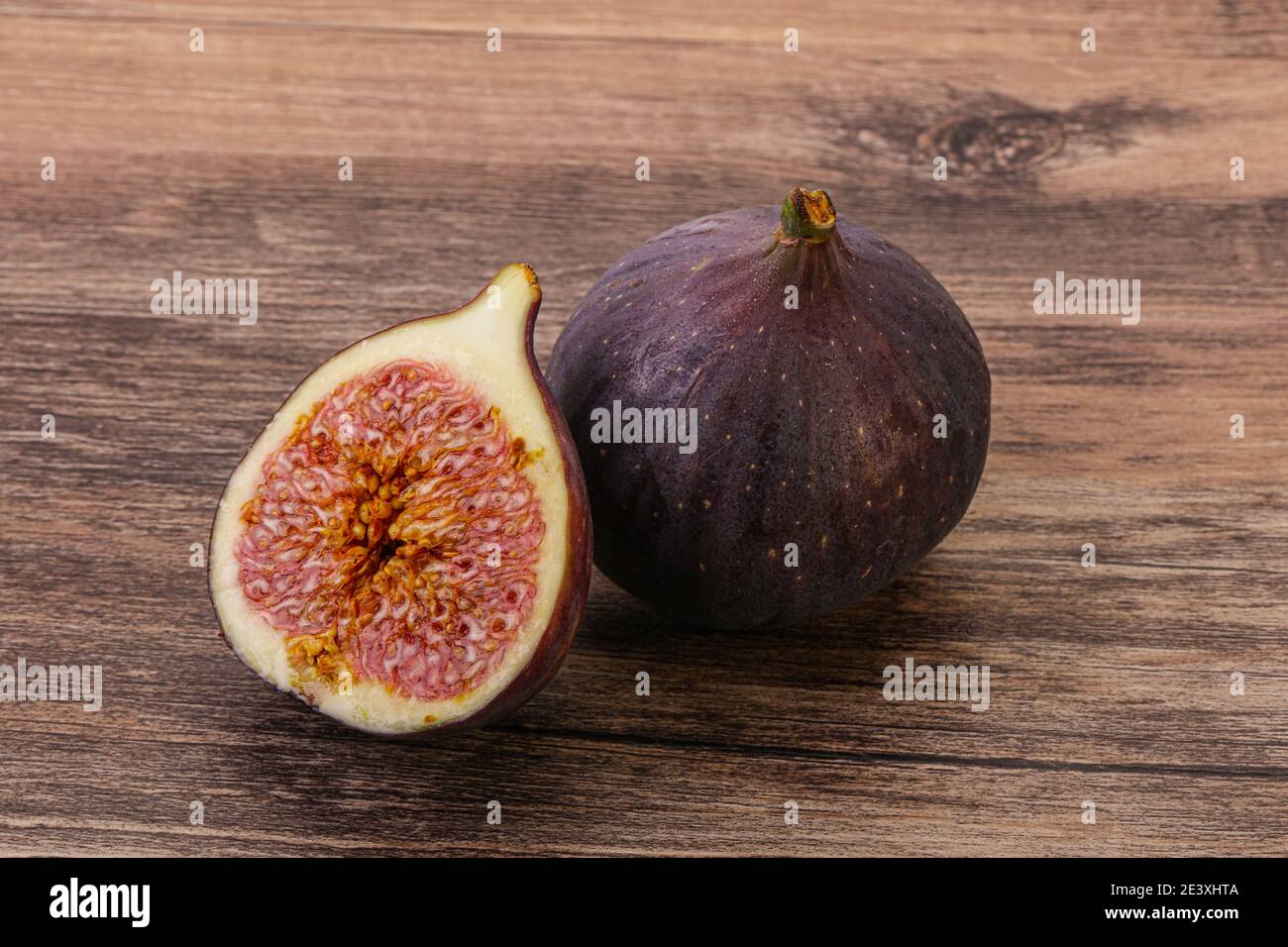 Sweet purple slice of fig fruit Stock Photo - Alamy