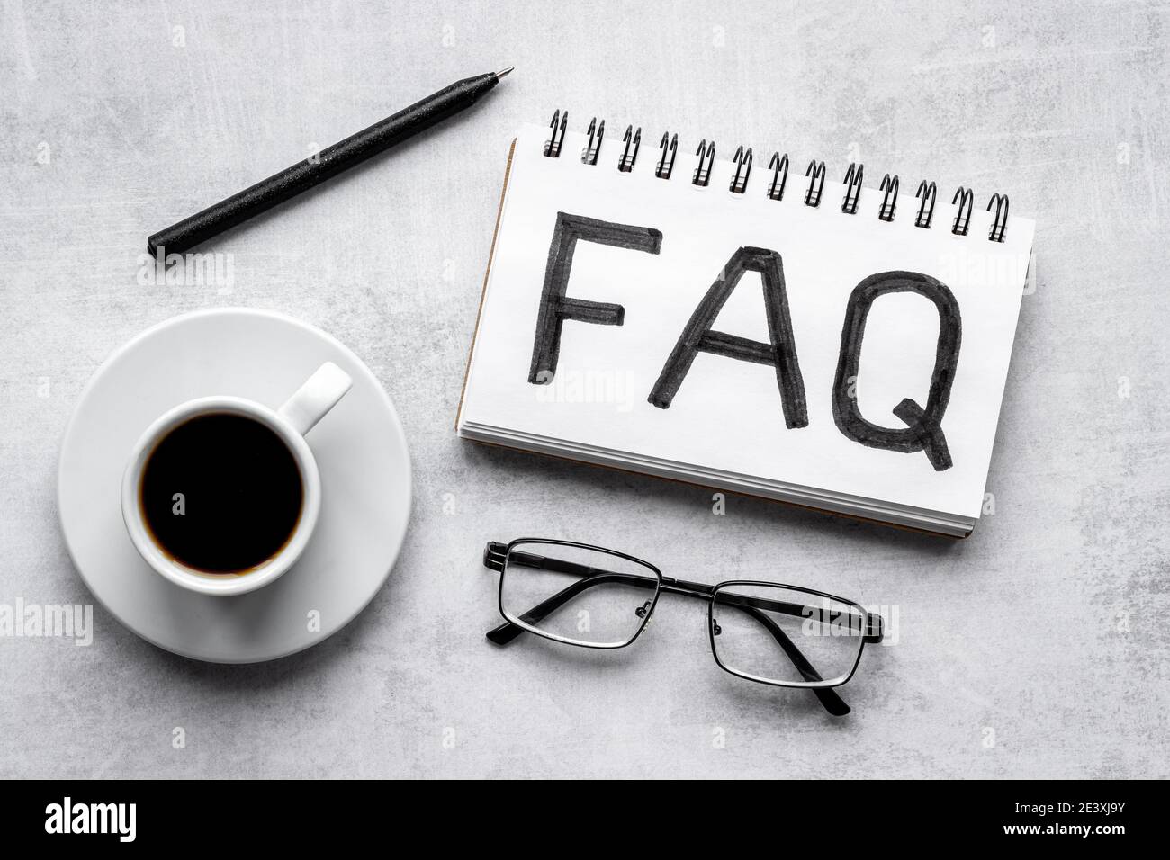 FAQ concept. Text on office table. Information Helpdesk Stock Photo - Alamy