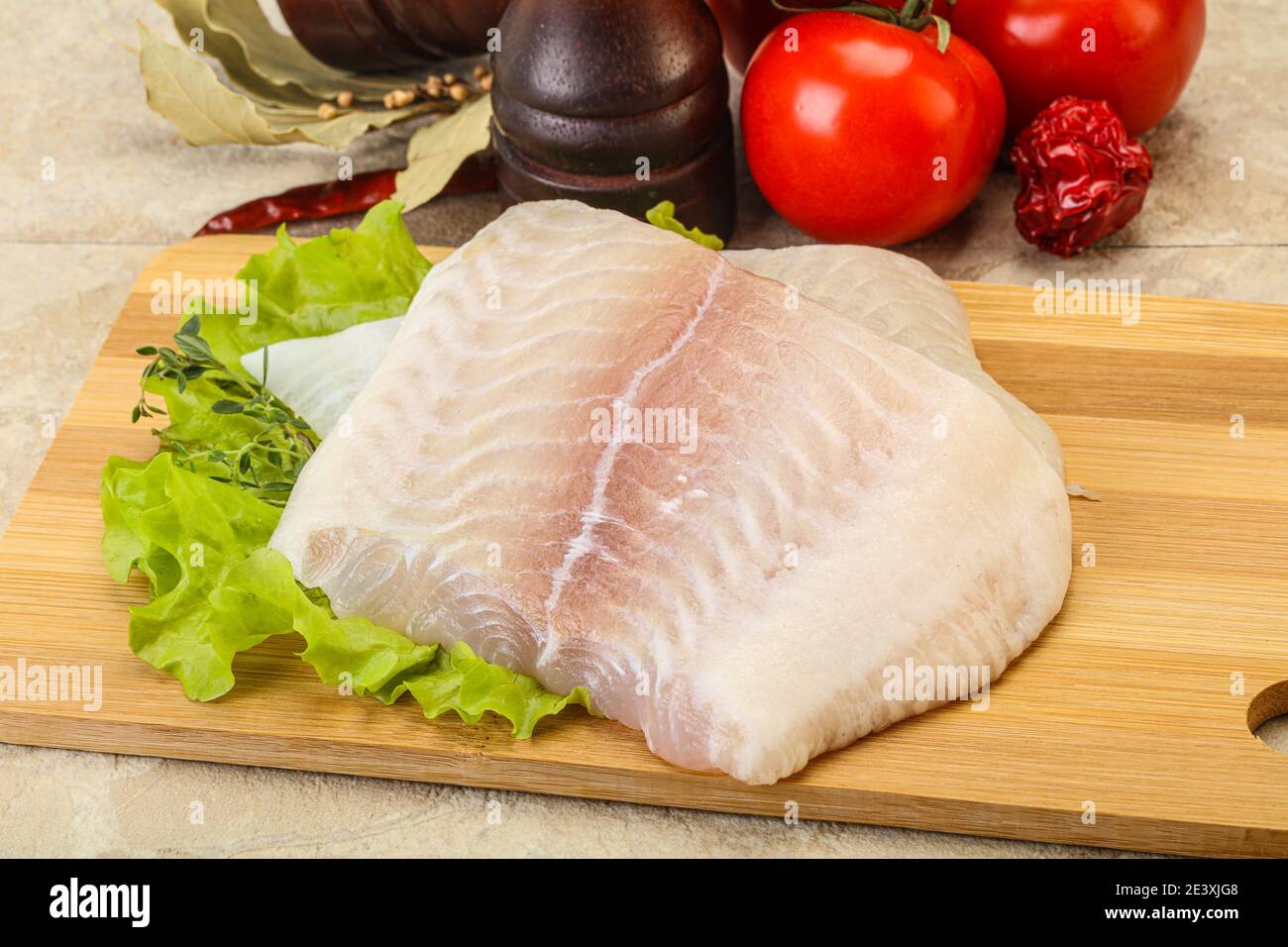 Raw pangasius fillet fish for cooking Stock Photo - Alamy